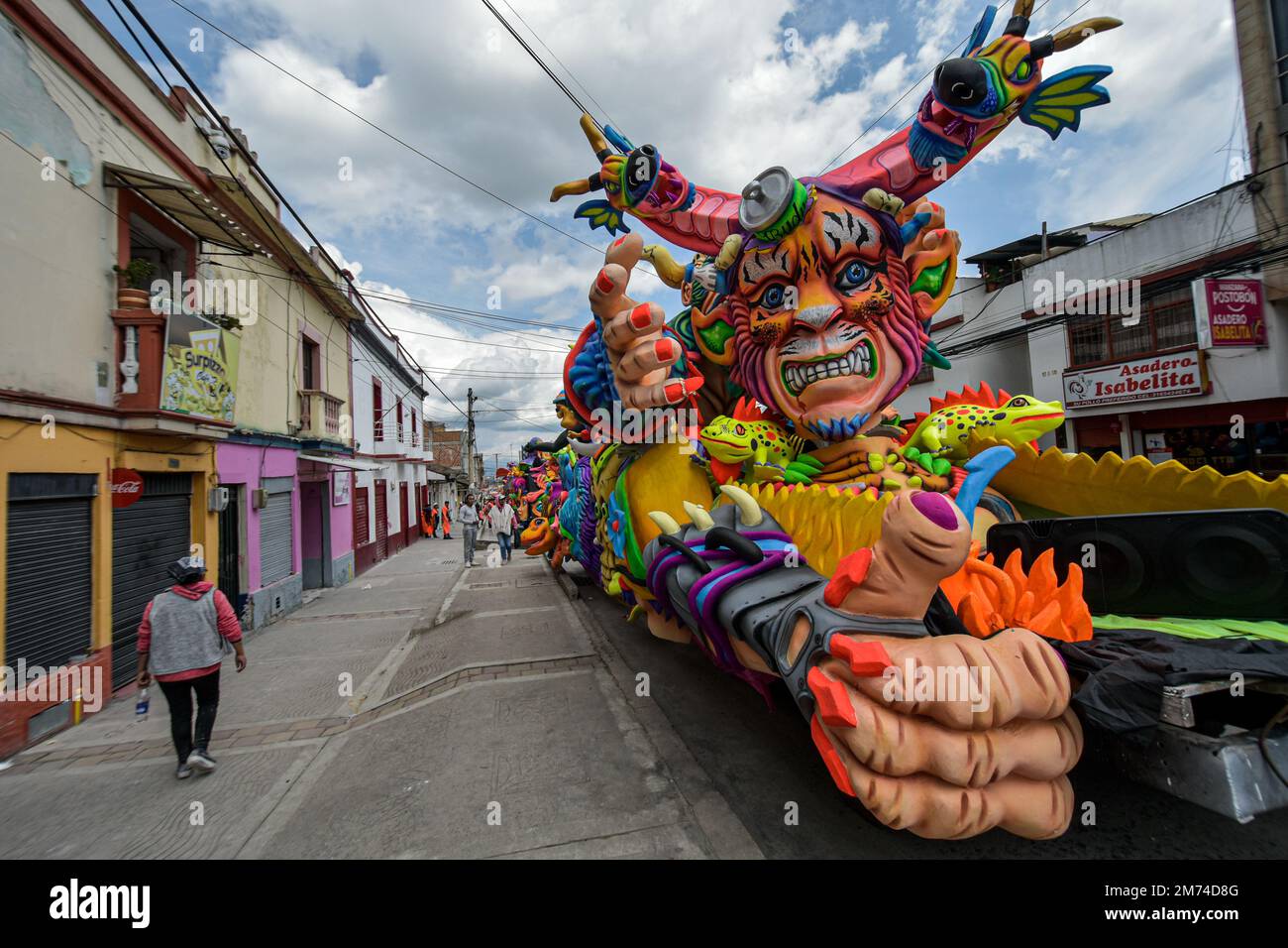Artists and performers dance during the traditional 'Carnaval de Negros ...