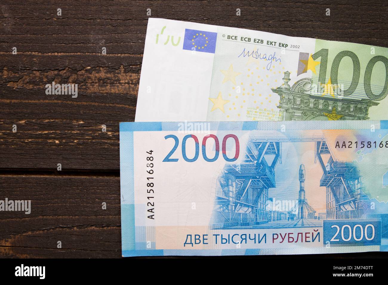 Banknotes Euros, Banknotes Russian Rubles on the black background ...