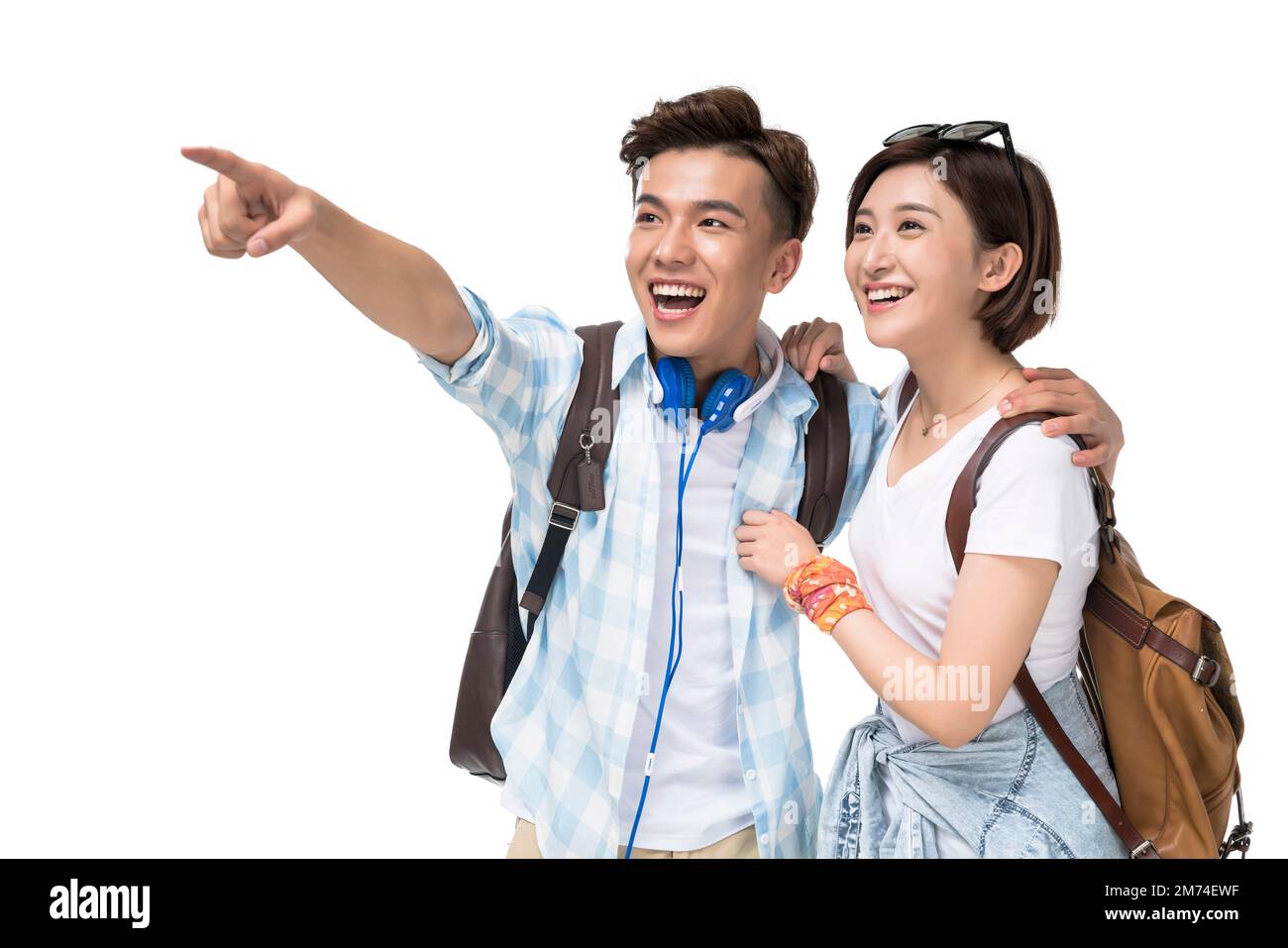Happy young couple backpacking trip Stock Photo - Alamy