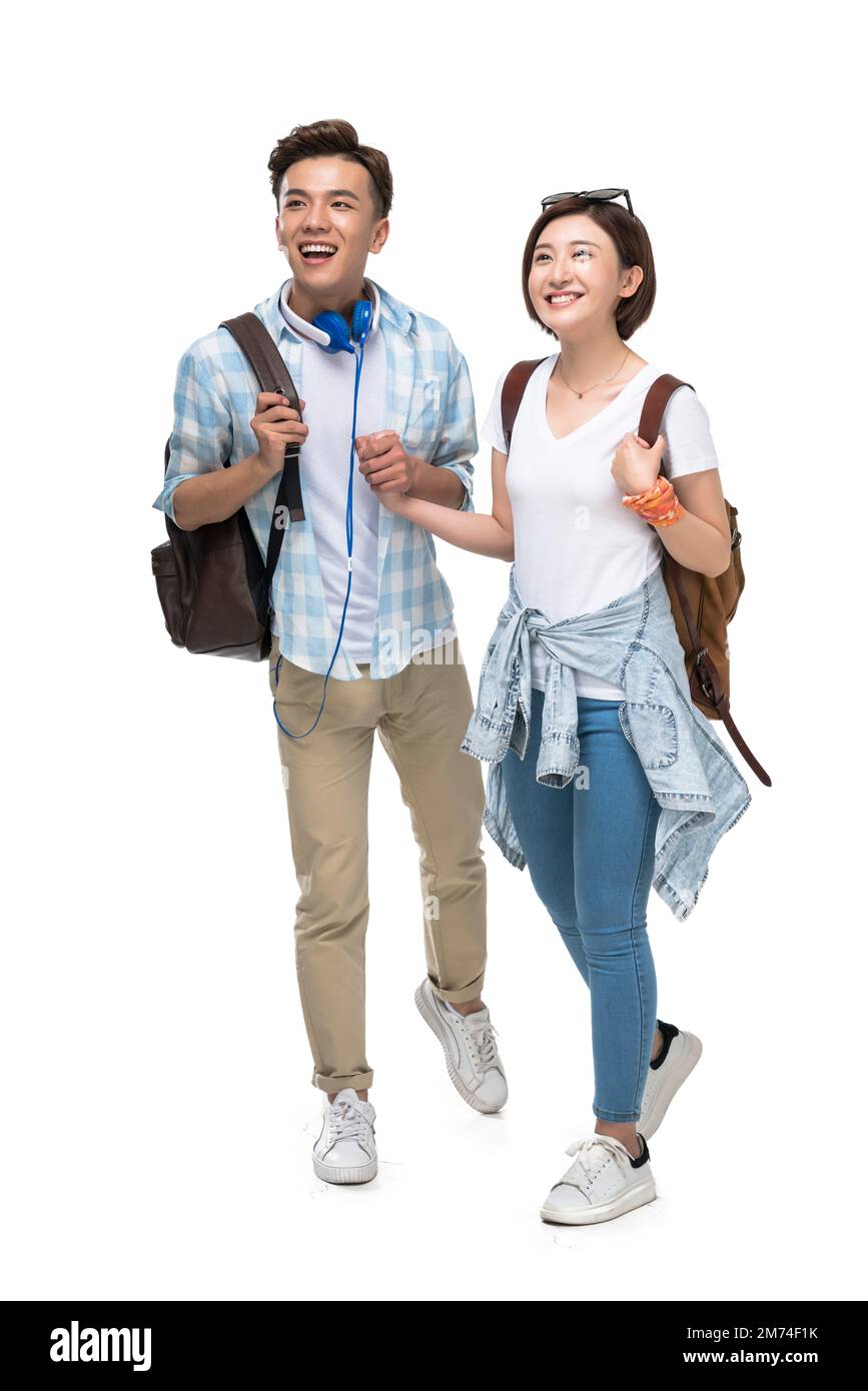 Happy young couple backpacking trip Stock Photo - Alamy
