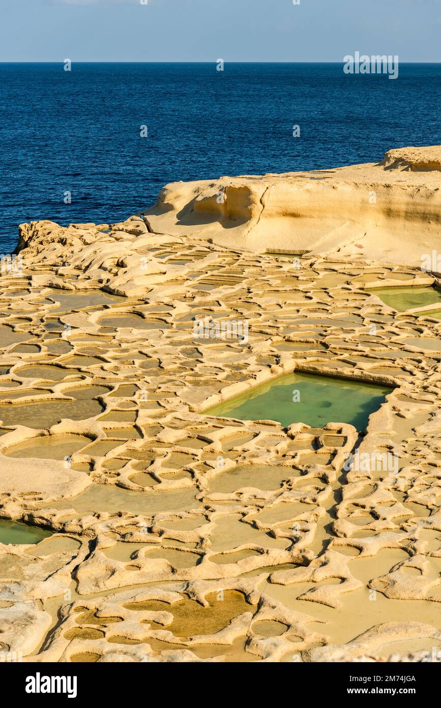 Traditional salt pans in Xwejni Bay on the island of Gozo, Malta Stock ...