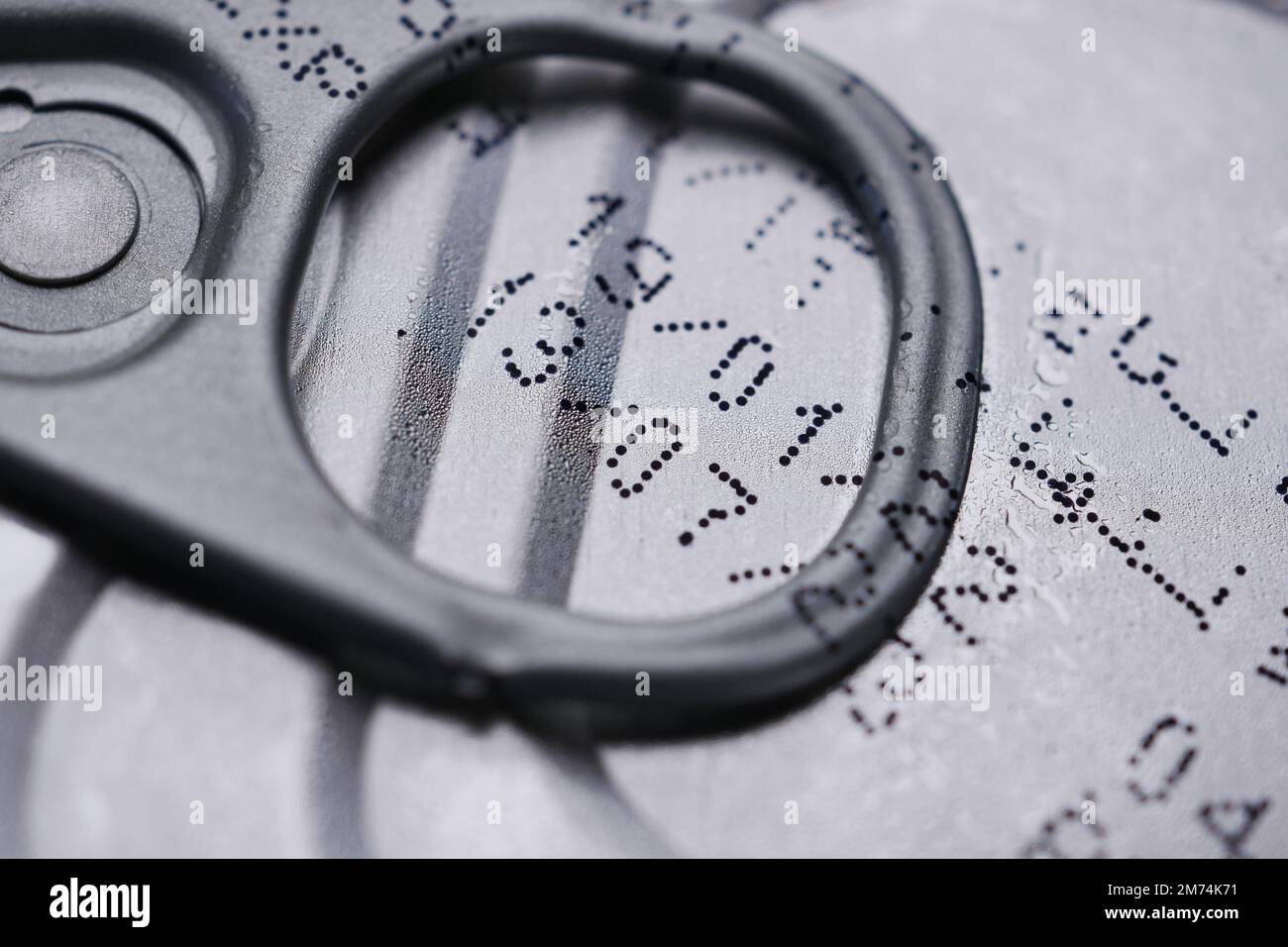 expire date on food can on white background Stock Photo - Alamy