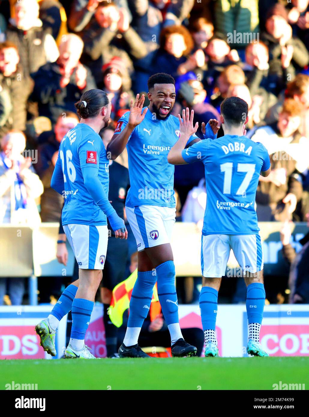 Chesterfield's Tyrone Williams (centre) celebrates with team-mate ...