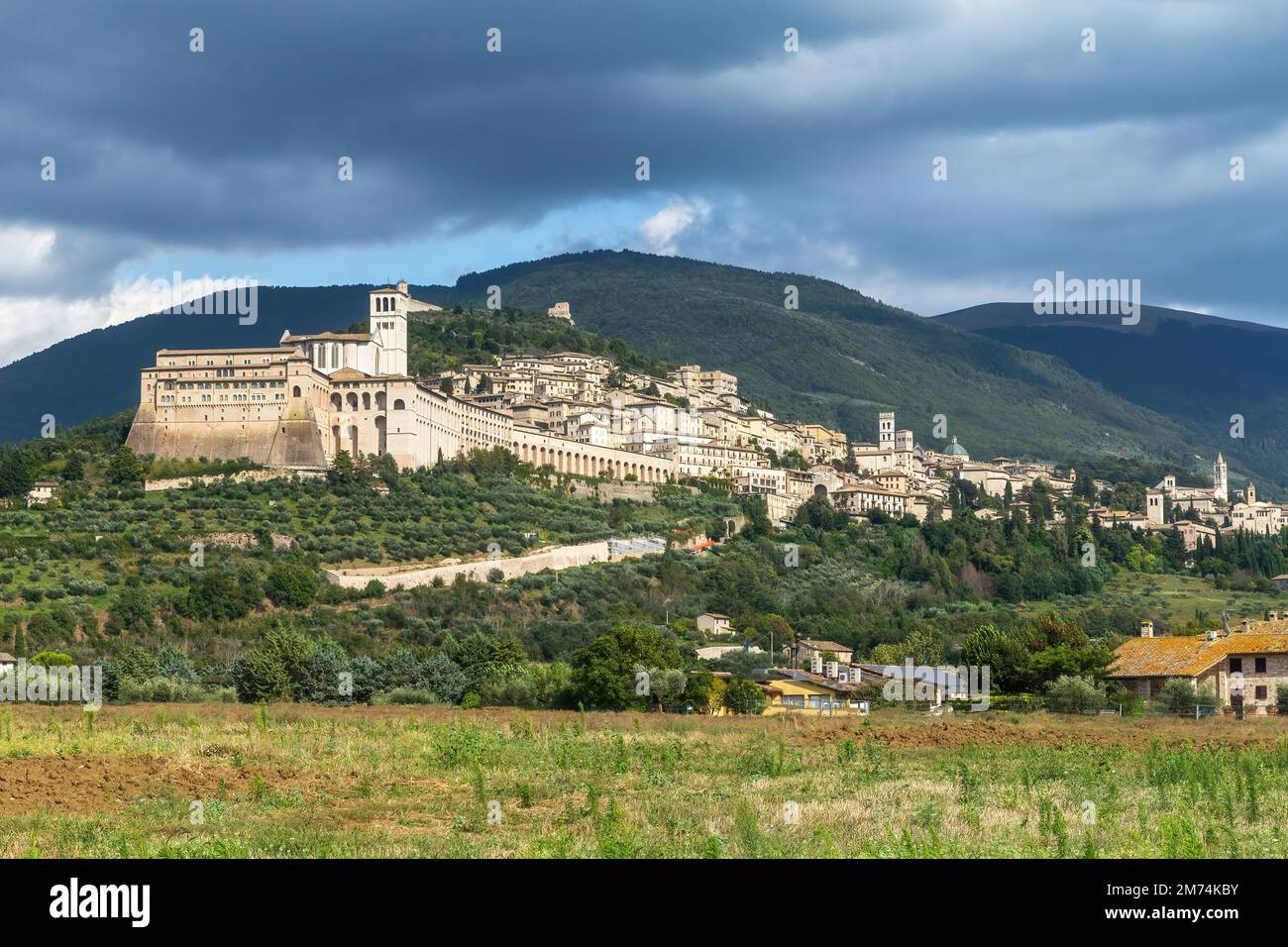 View of Assisi village in Umbria region, Italy. The town is famous for ...