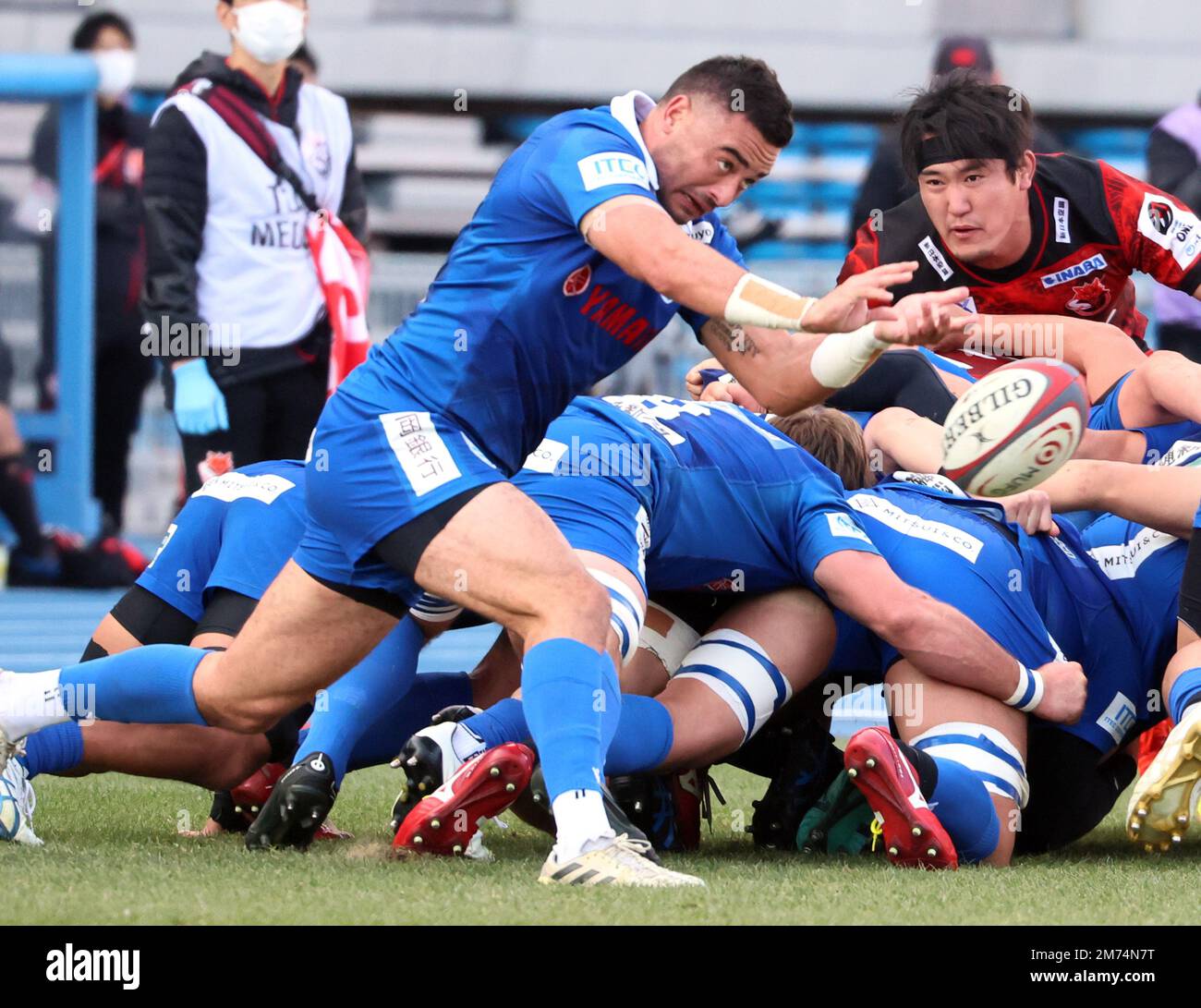 January 7, 2023, Kawasaki, Japan - Shizuoka BlueRevs scrum half Bryn Hall passes the ball during ...