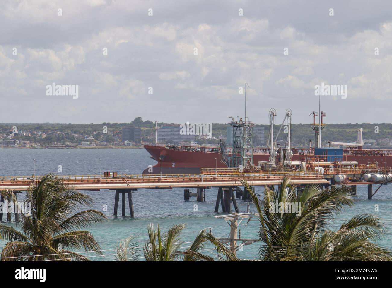 An oil tanker uploading in the port in Matanzas, Cuba Stock Photo - Alamy