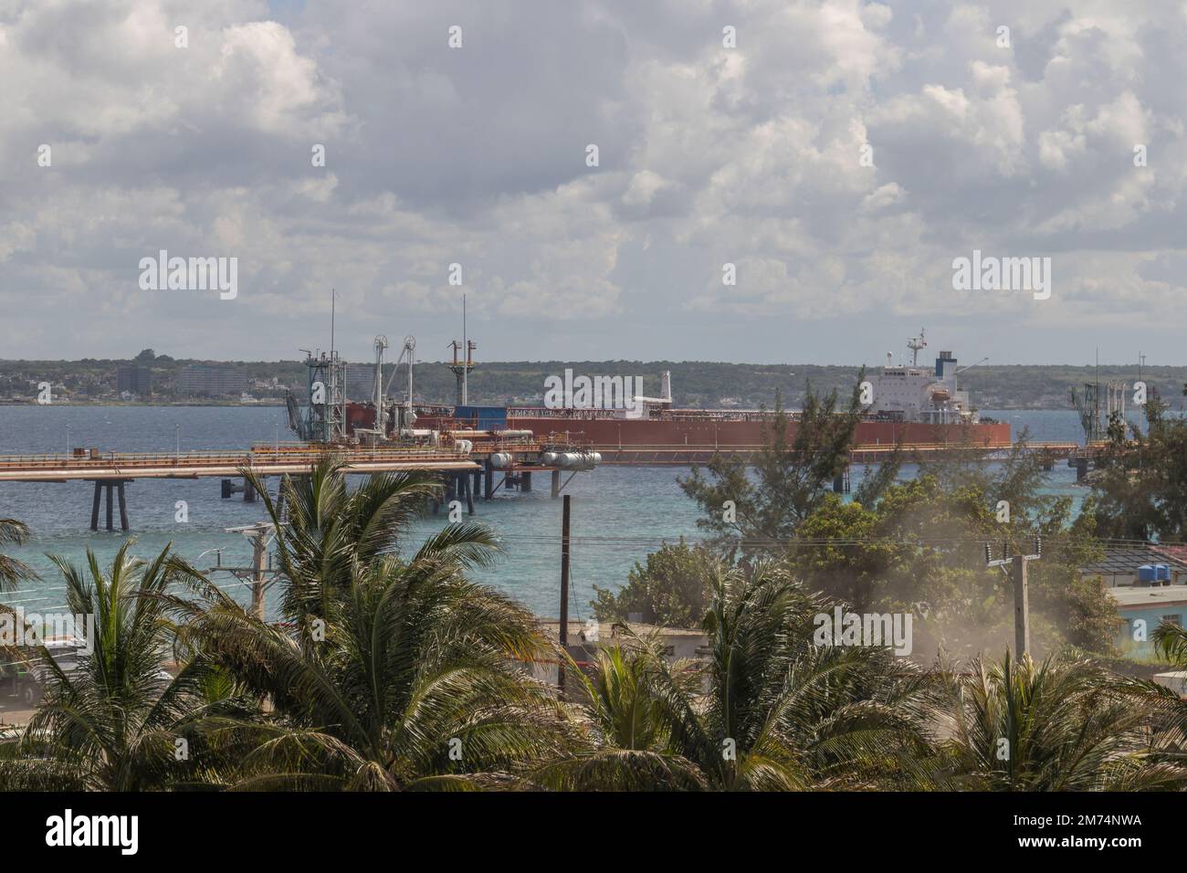An oil tanker uploading in the port in Matanzas, Cuba Stock Photo - Alamy