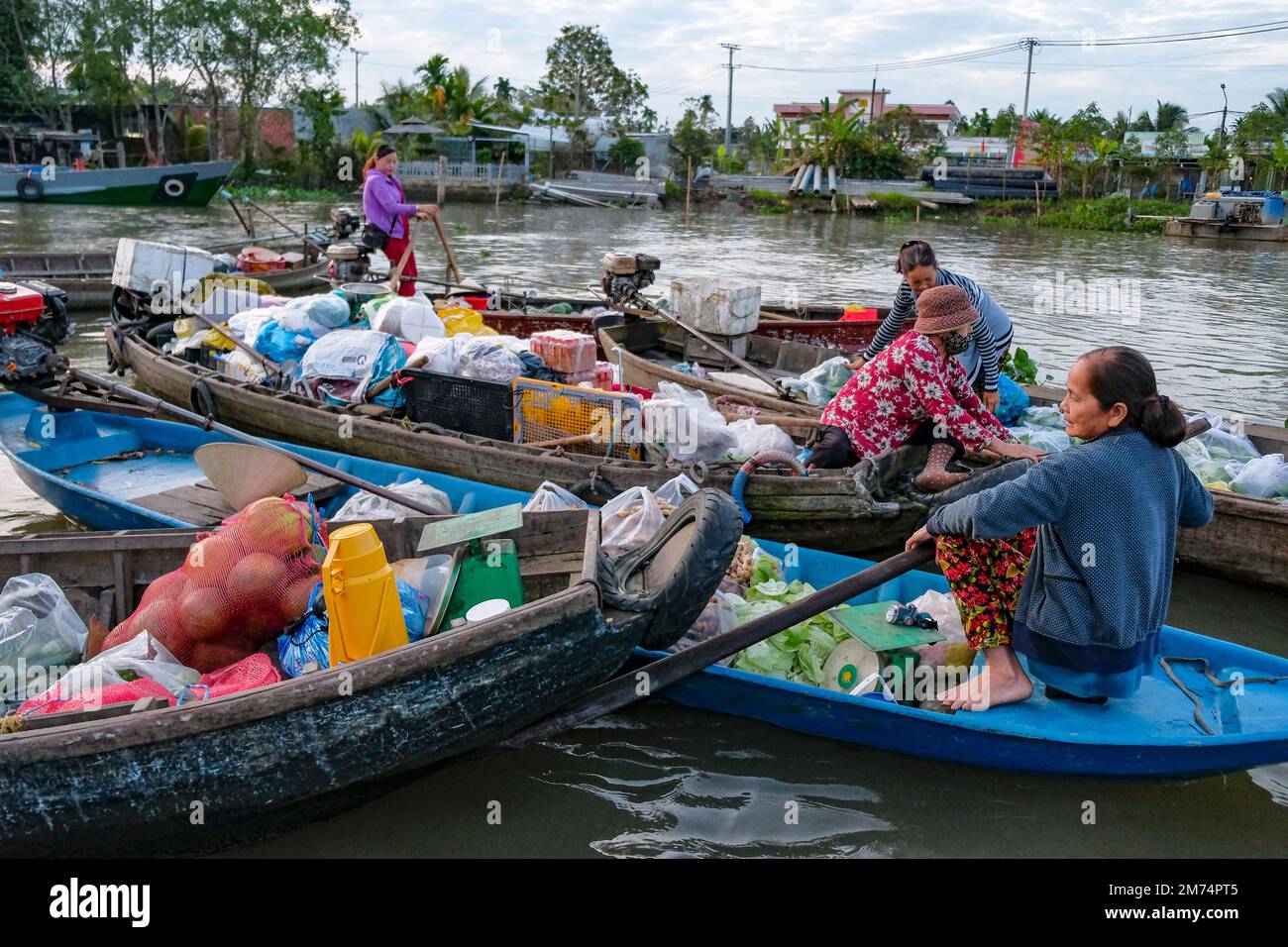 Can Tho, Vietnam - January 4, 2023: Fruit and vegetable vendors at the ...
