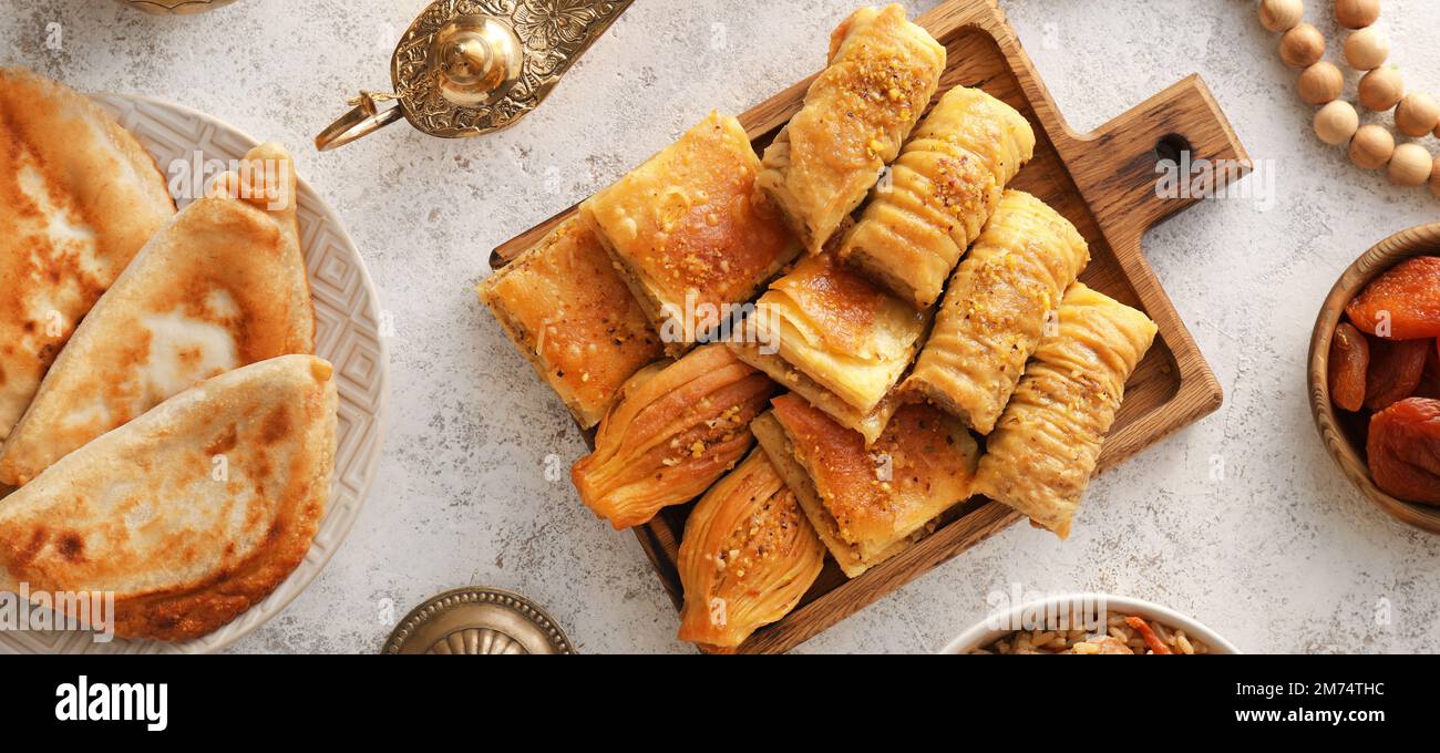Traditional Eastern dishes on light background Stock Photo - Alamy