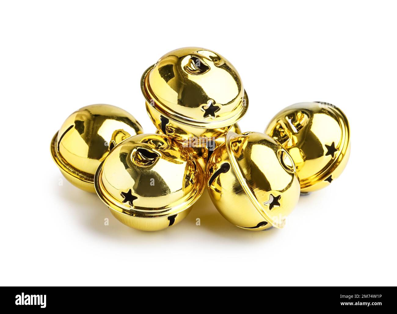 Yellow Christmas bells on white background Stock Photo - Alamy