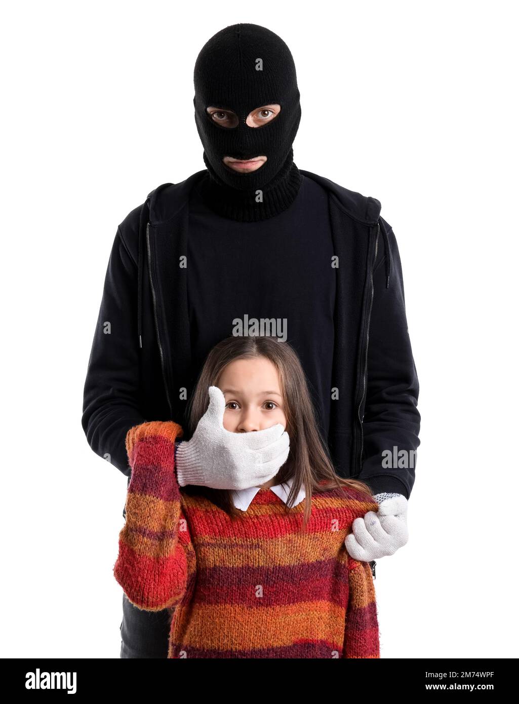 Terrorist and scared little hostage on white background Stock Photo - Alamy
