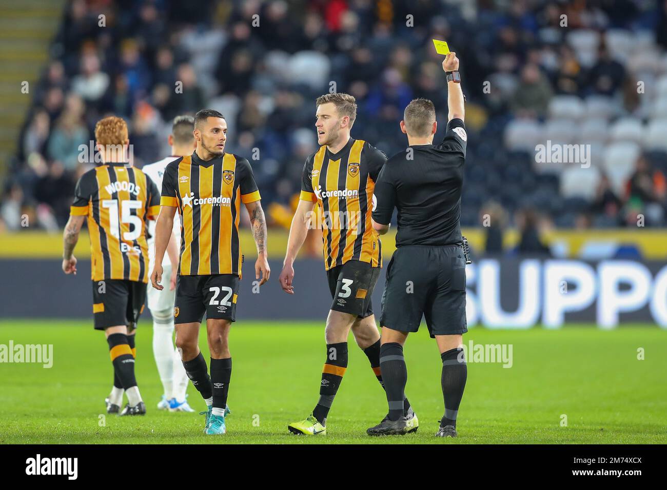 Callum Elder #3 of Hull City receives a yellow card from referee Joshua ...