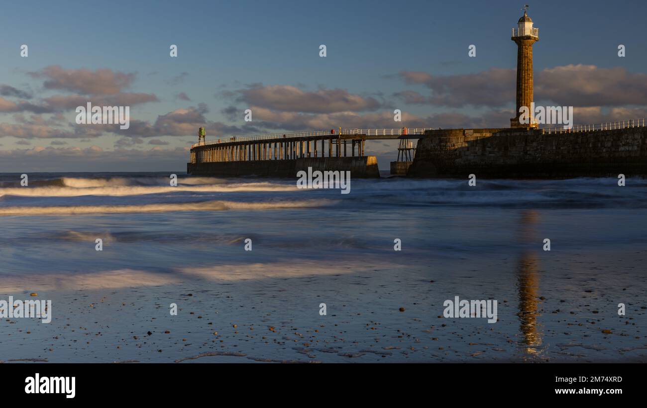 A long exposure shot of the North Pier and North Sea at Whitby Stock ...