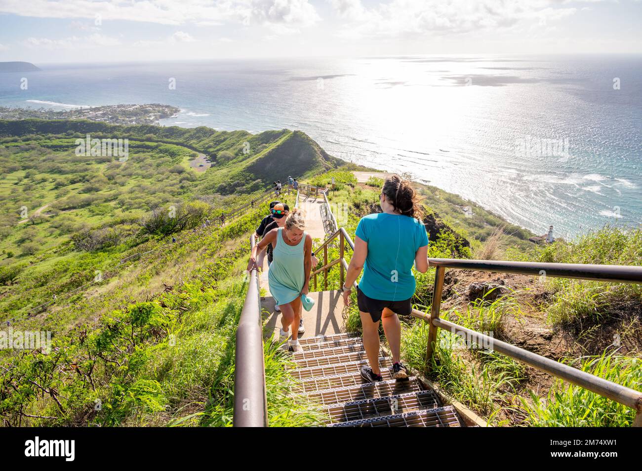 Honolulu, Hawaii - December 27, 2022: Tourists hiking down the Diamond ...