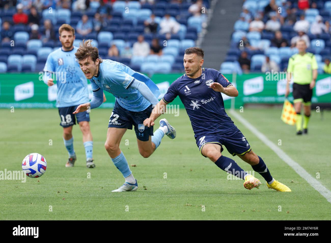 Max Burgess of Sydney FC competes for the ball with Kosta Barbarouses ...