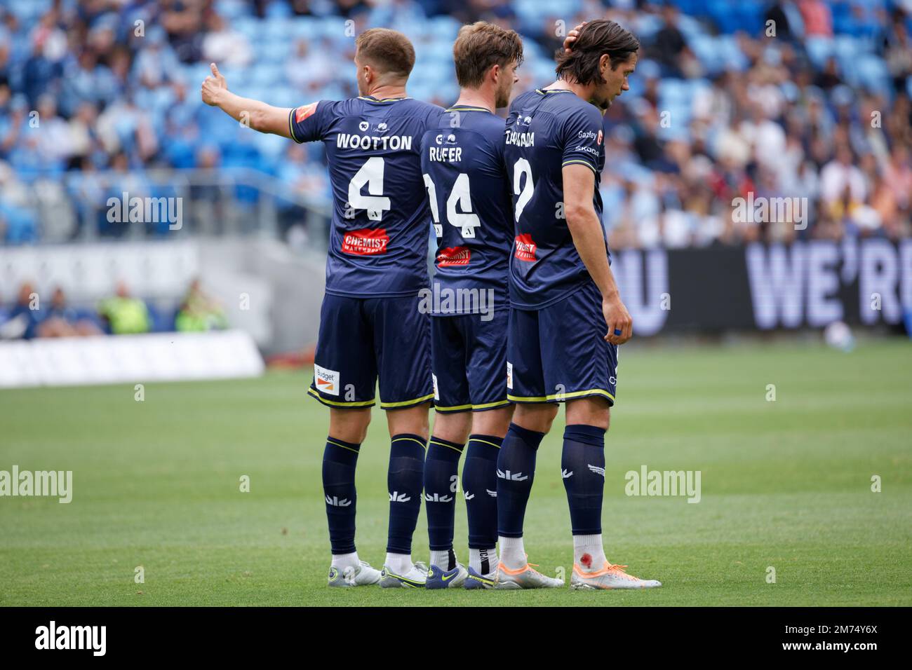 Scott Wootton, Alex Rufer and Oskar Kawada of Wellington form a wall to ...