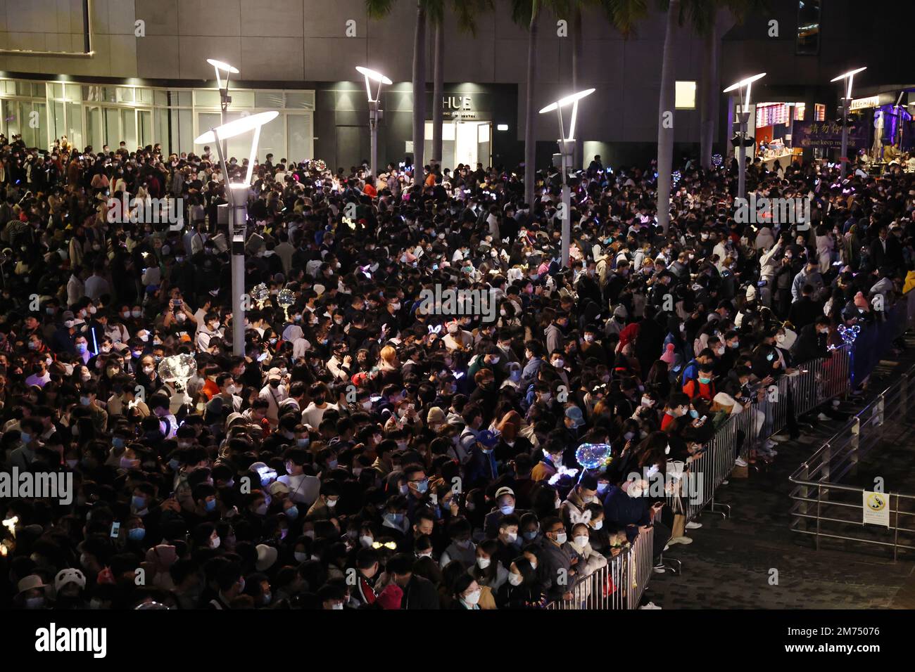 People celebrate at Victoria Harbour waterfront in Tsim Sha Tsui before ...