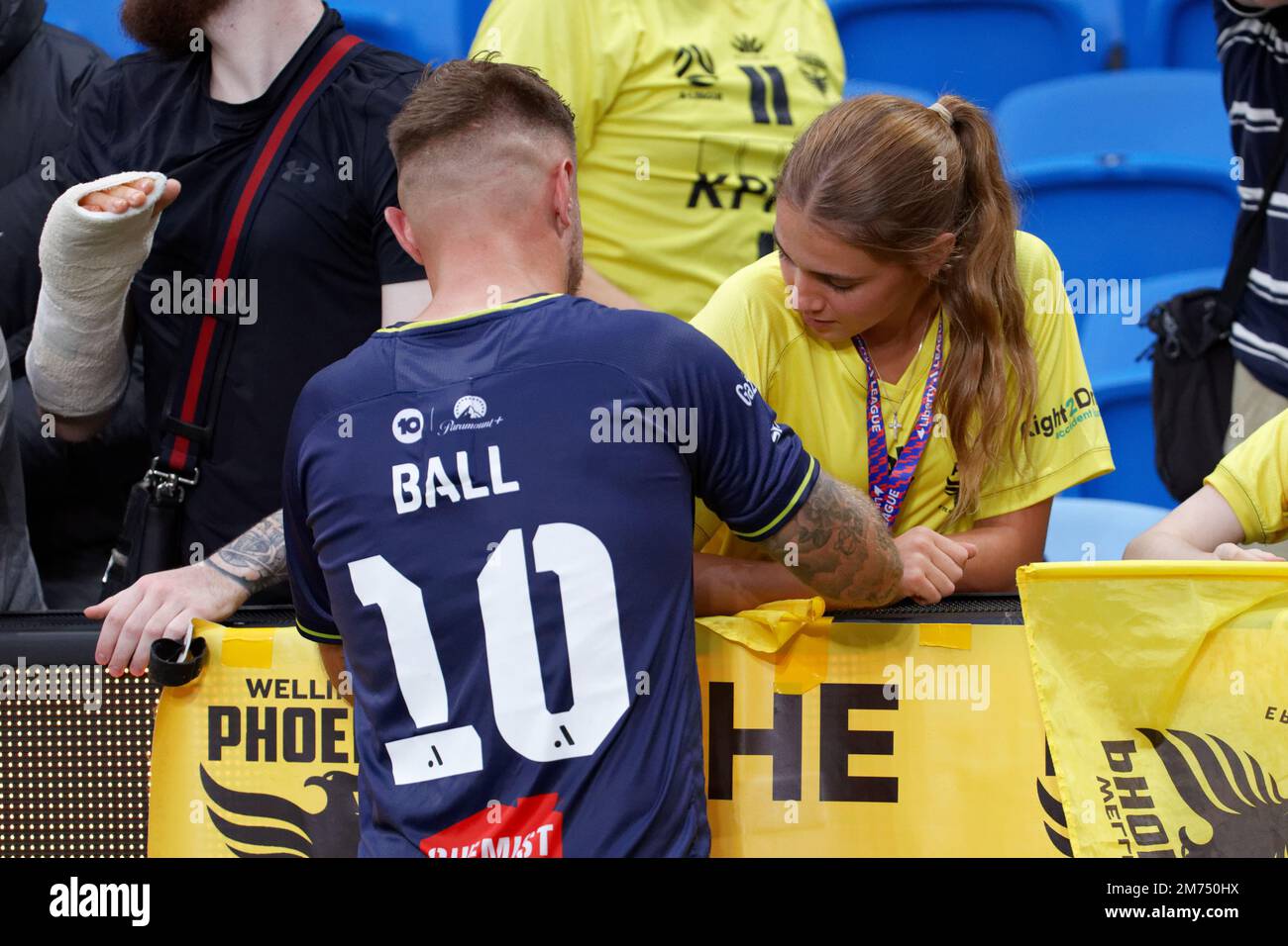 David Ball of Wellington Phoenix thanks supporters by signing ...