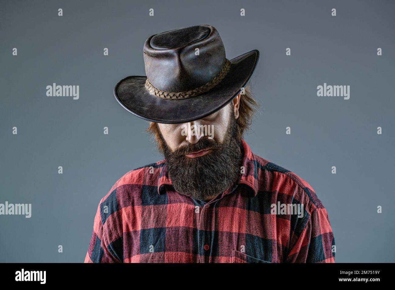 American cowboy. Leather Cowboy Hat. Portrait of young man wearing ...