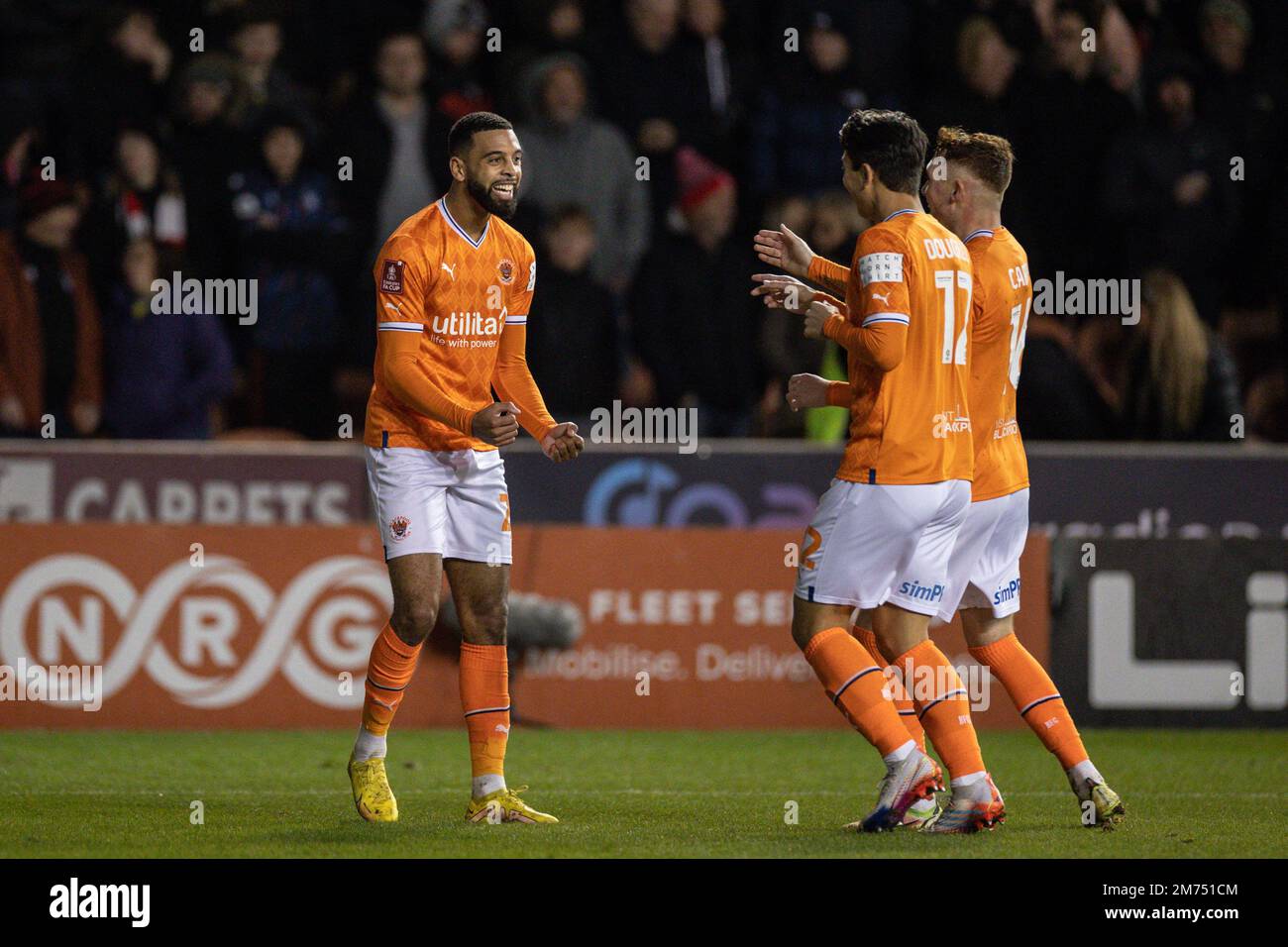 CJ Hamilton #22 of Blackpool celebrates his goal to make it 3-0 during ...