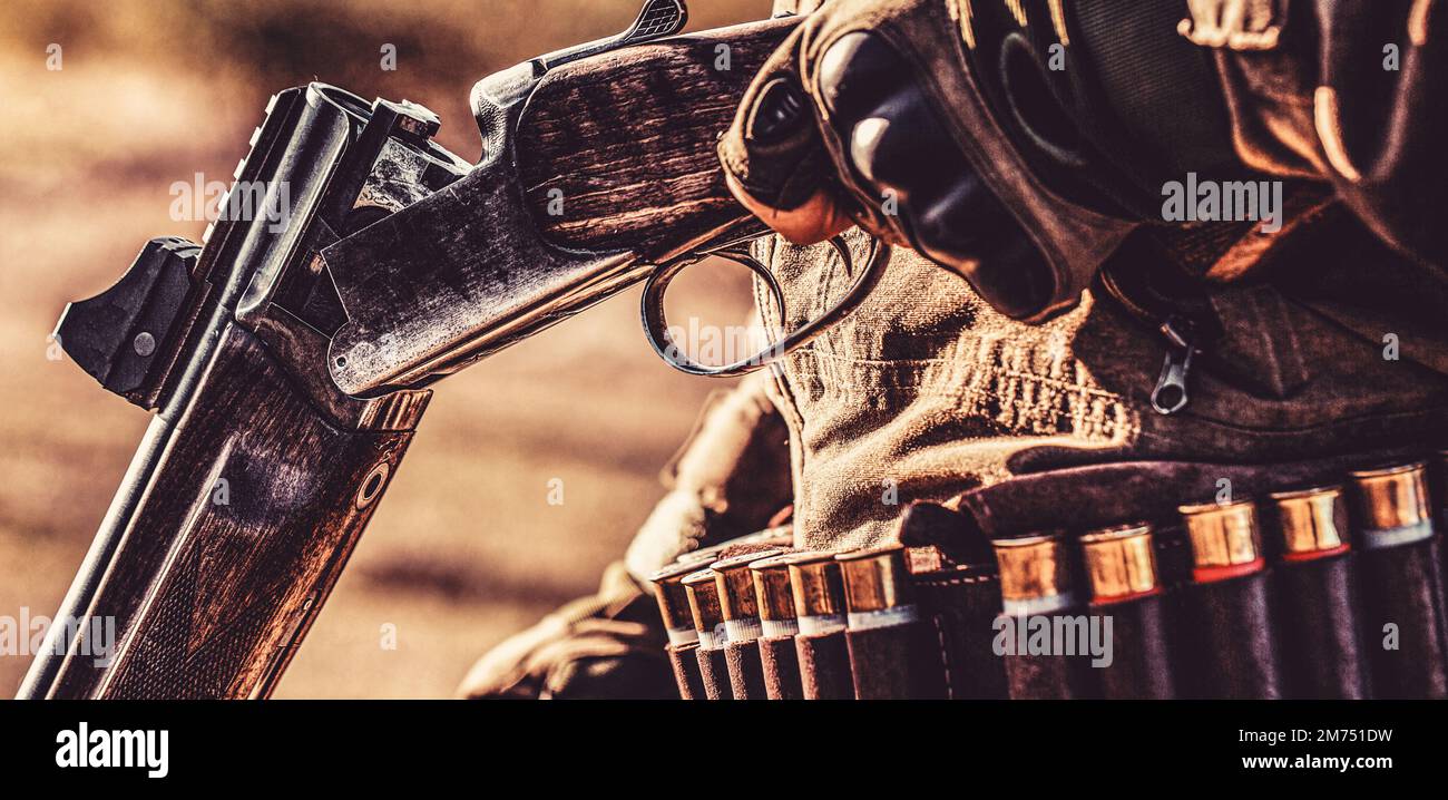 Hunter man. The man is on the hunt. Hunter with a backpack and a ...