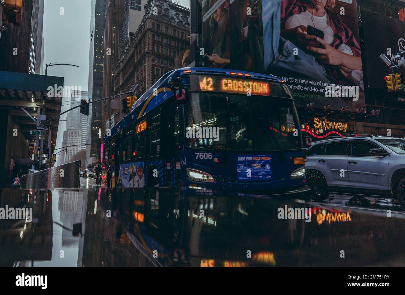 New York City on a rainy day a bus coming towards me on the Times ...