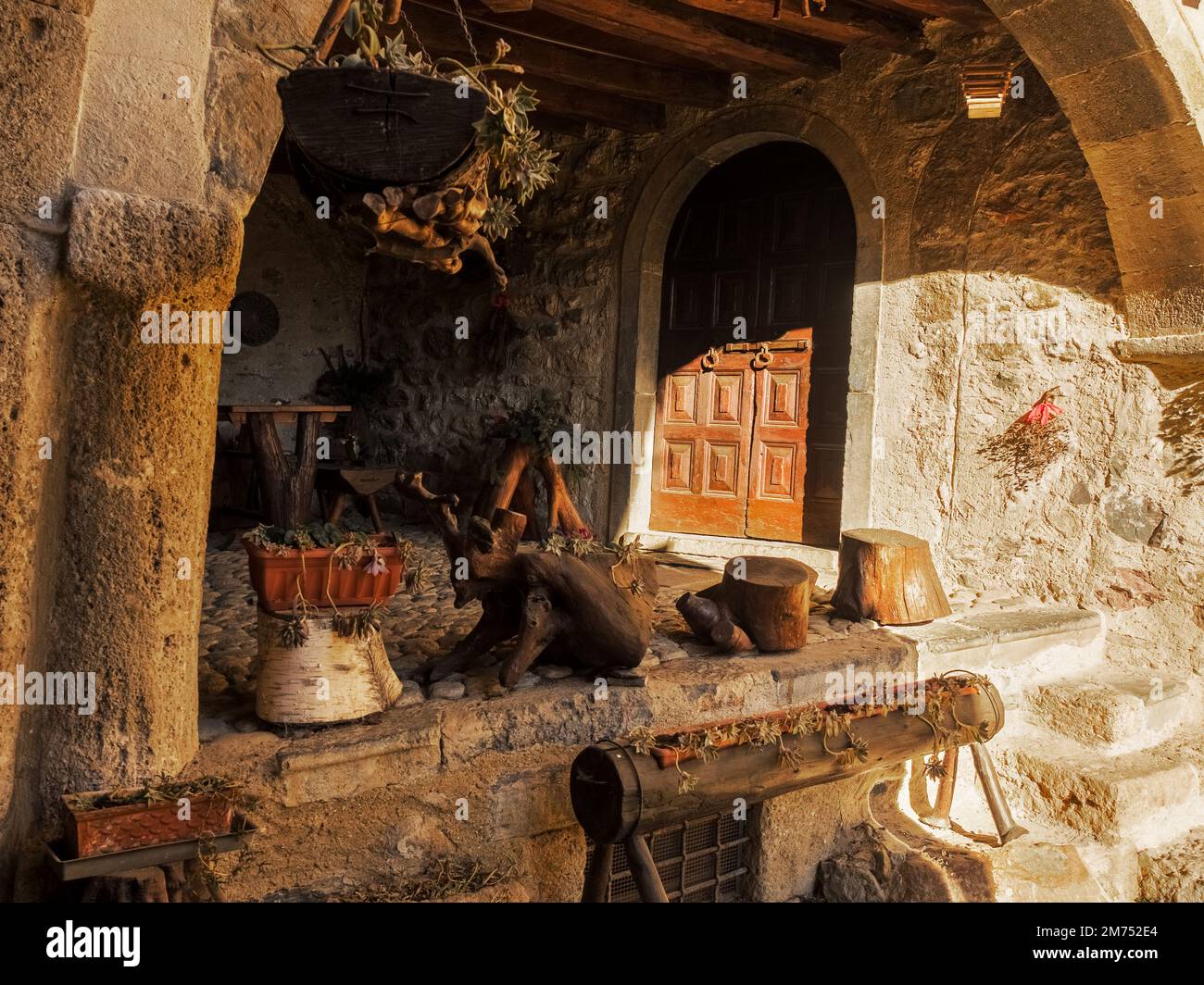 CORNELLO DEI TASSO BG ITALY -02-20-2022: a small stone terrace with ...