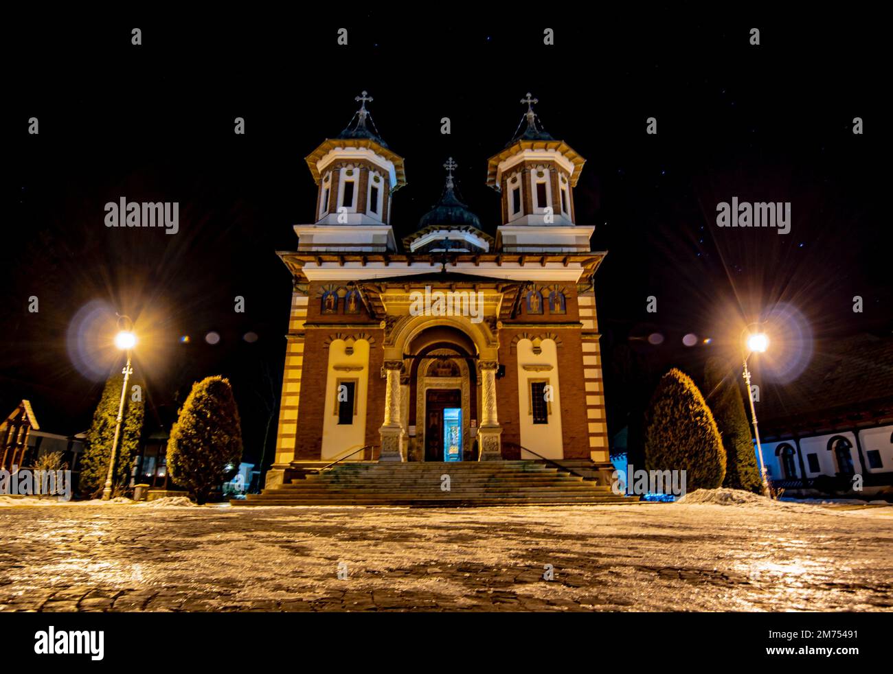A night view of the illuminated Sinaia Monastery Stock Photo - Alamy