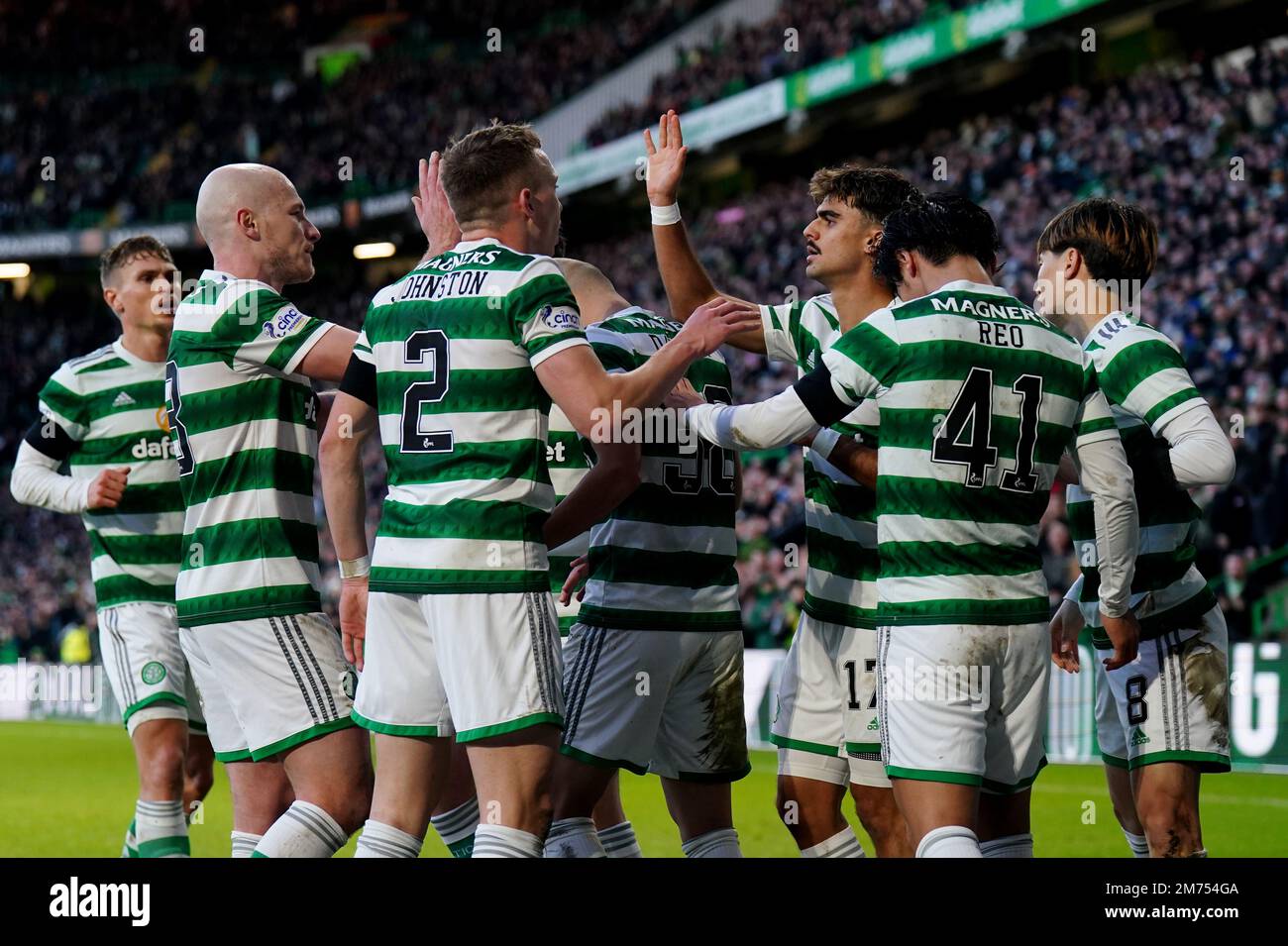 Celtic's Jota (third right) celebrates with his team mates after ...