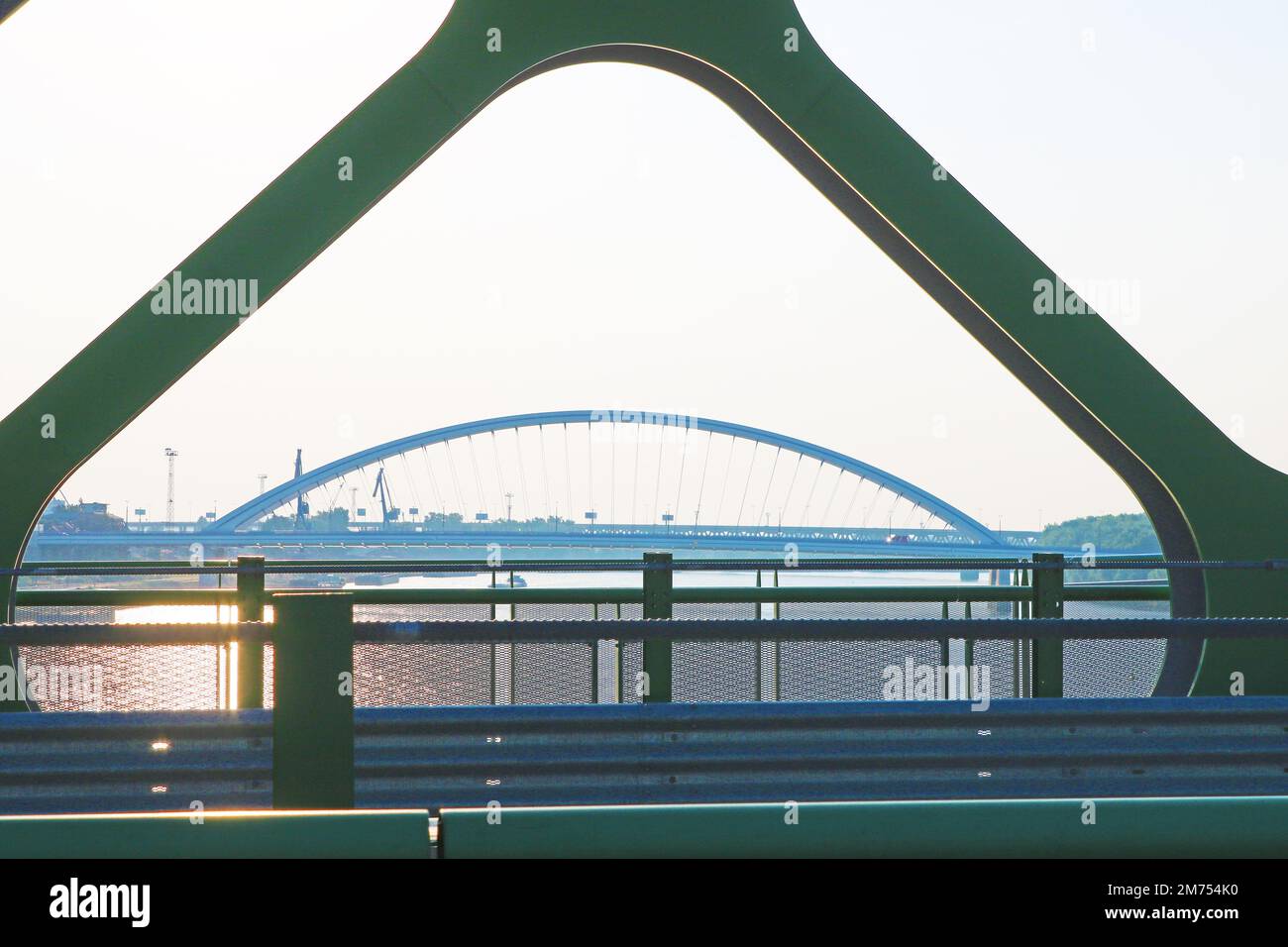 The view of Apollo bridge through arches of Old Bridge over the Danube ...