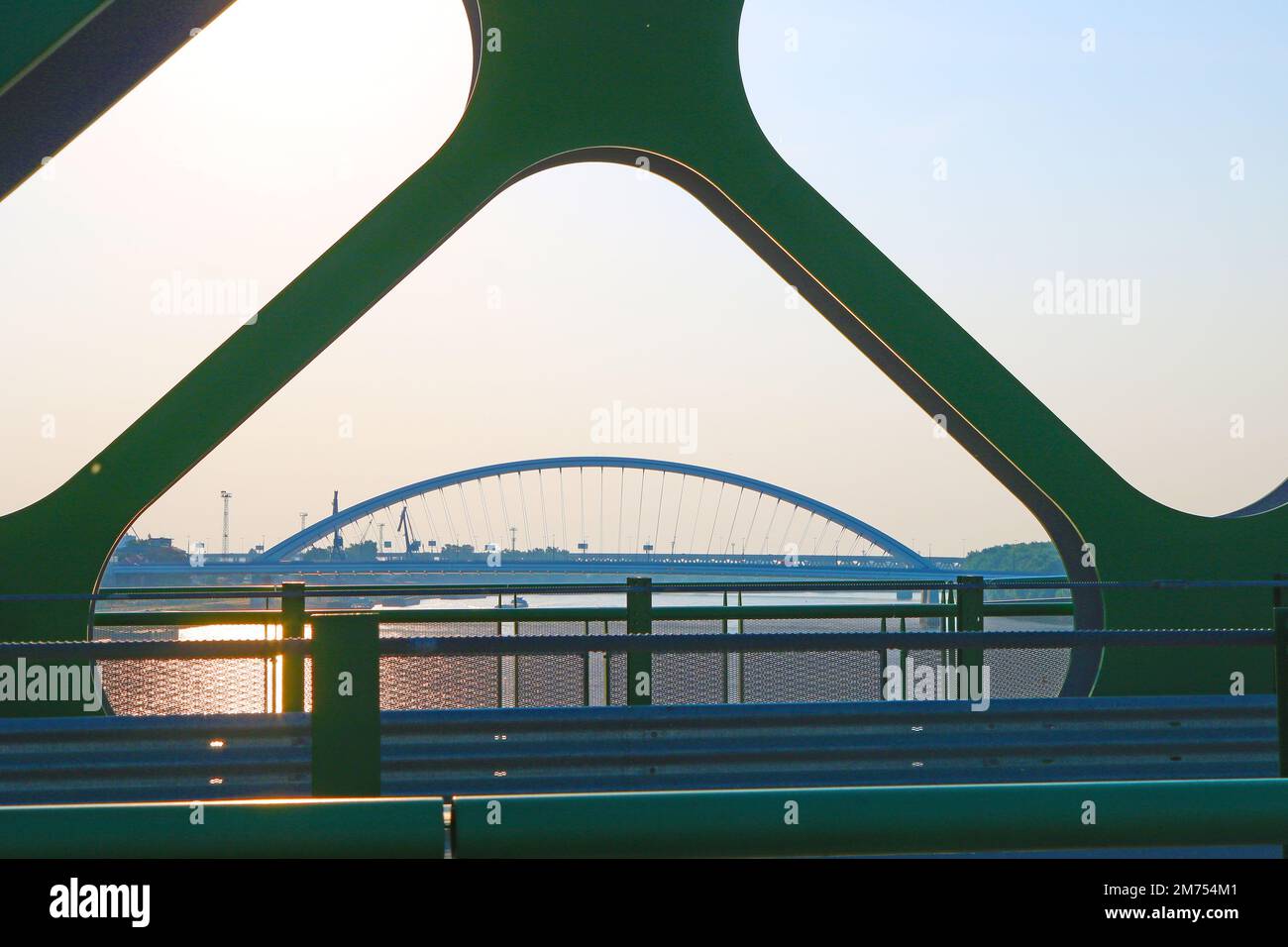 The view of Apollo bridge through arches of Old Bridge over the Danube ...