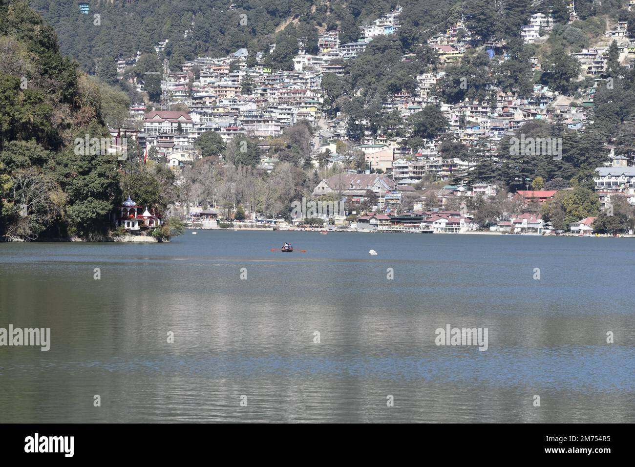 A beautiful landscape of Naini Lake in clean weather in Nainital, India ...