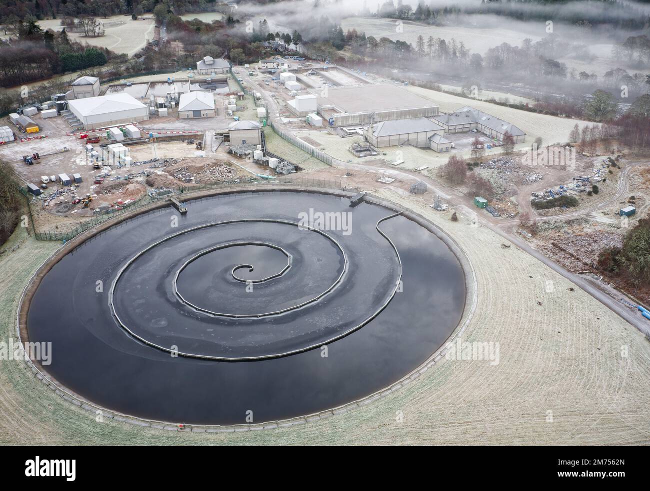 Sewage water works treatment plant aerial view from above showing waste ...