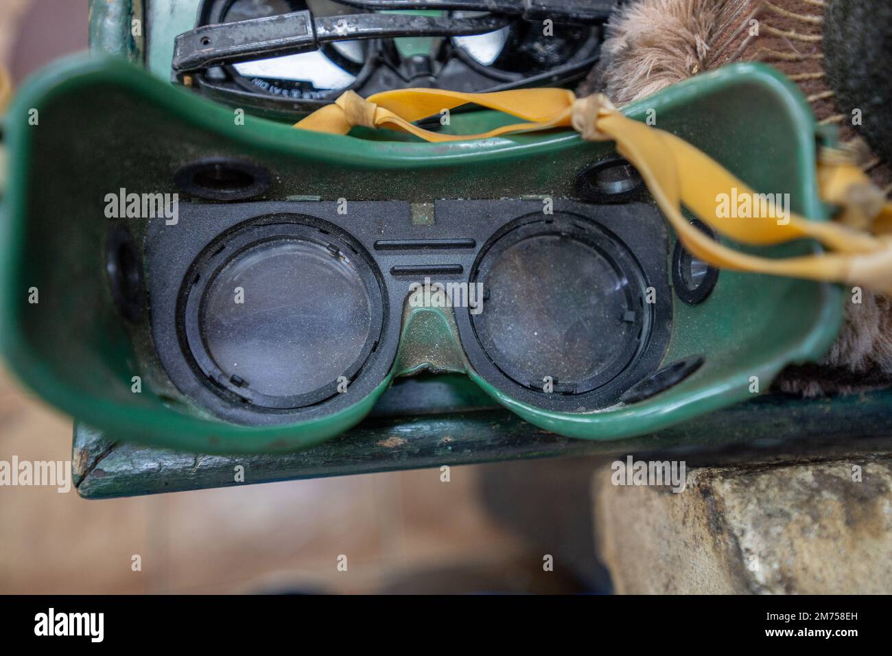 Vintage safety goggles. green goggles in a goldsmith's workshop ...