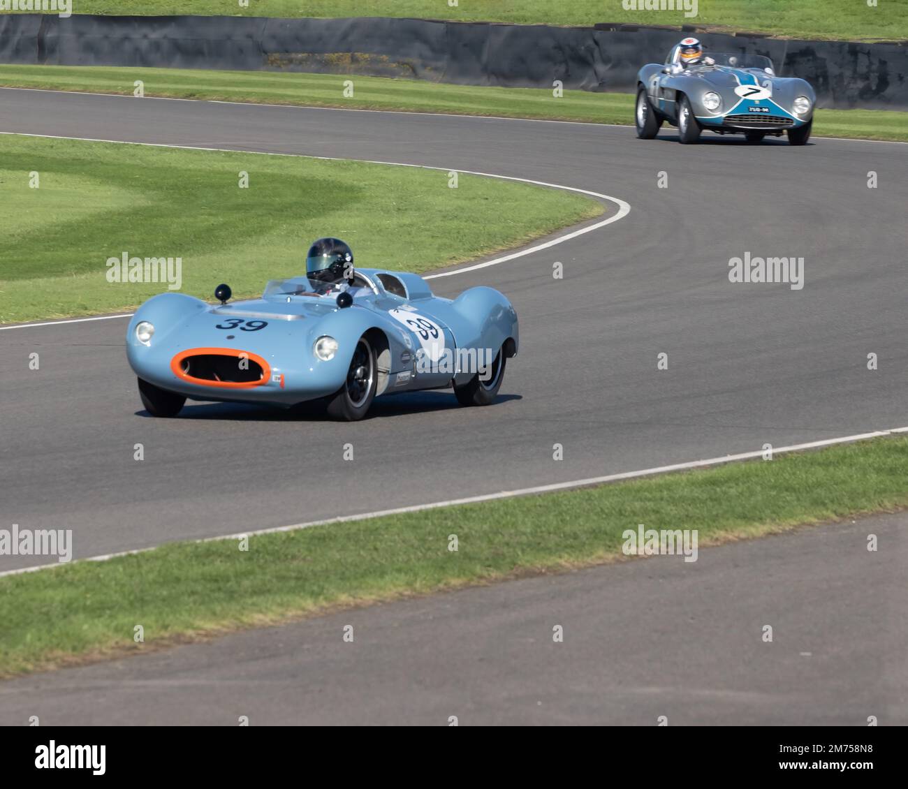 1955 Cooper-Climax T39 'Bobtail' No.39 leads 1955 Ferrari 750 Monza No ...