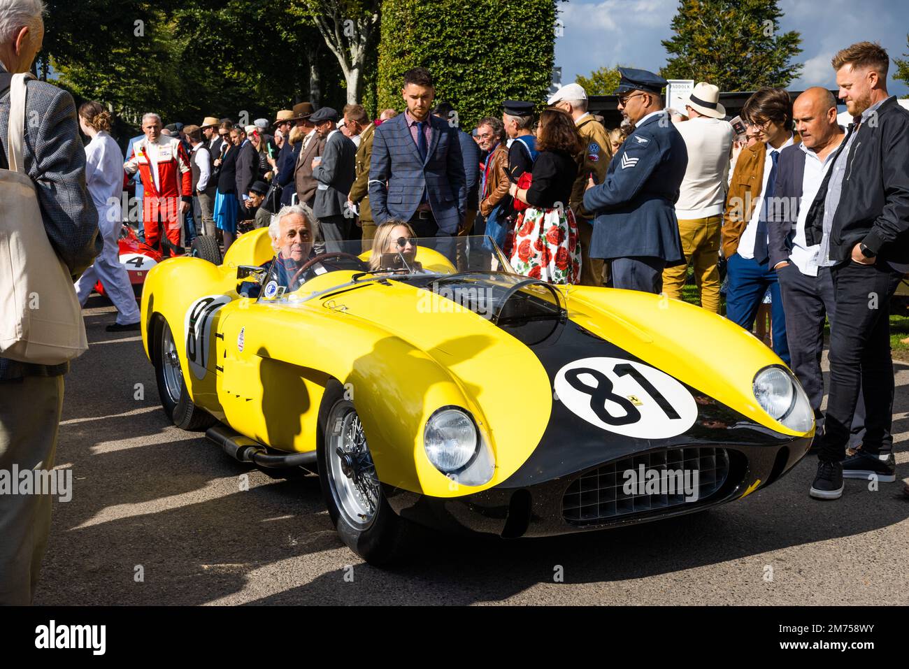 Yellow 1958 Ferrari 290MM/250 TR 81 heads for the racetrack at the 2022 ...