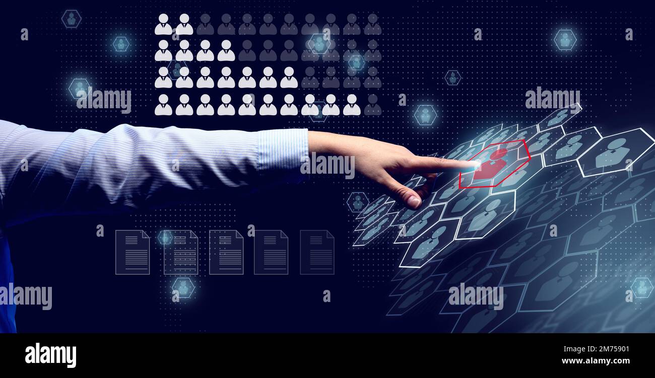 Hand reaches for a holographic scoreboard with employees on a dark blue ...