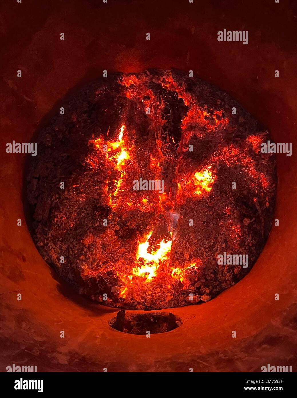 A burning fire in stove Stock Photo - Alamy