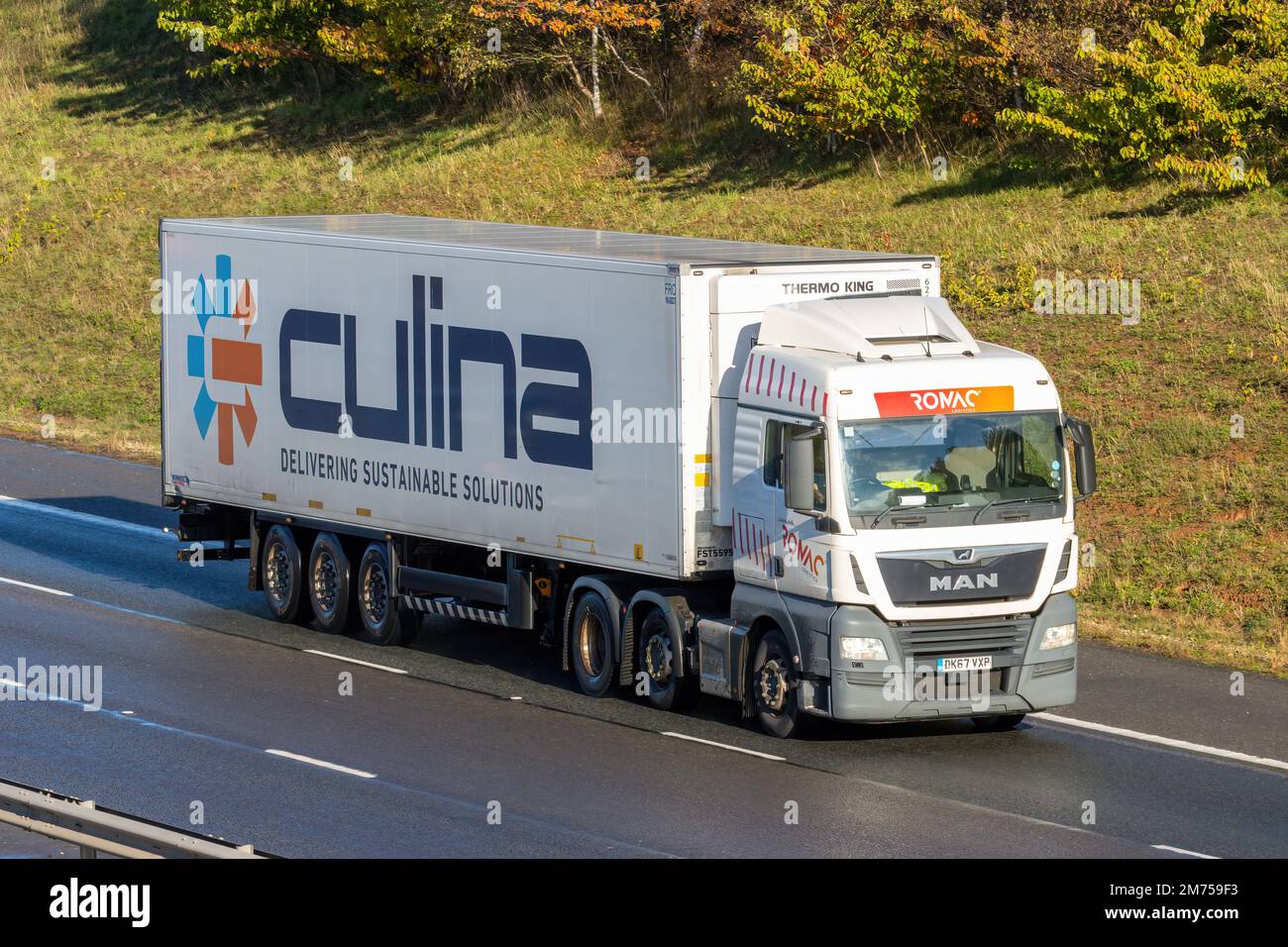 Romac Logistics MAN TGX DK67 VXP Stock Photo - Alamy