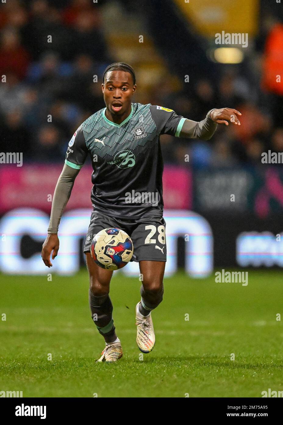 Plymouth Argyle midfielder Jay Matete (28) attacking during the Sky Bet ...