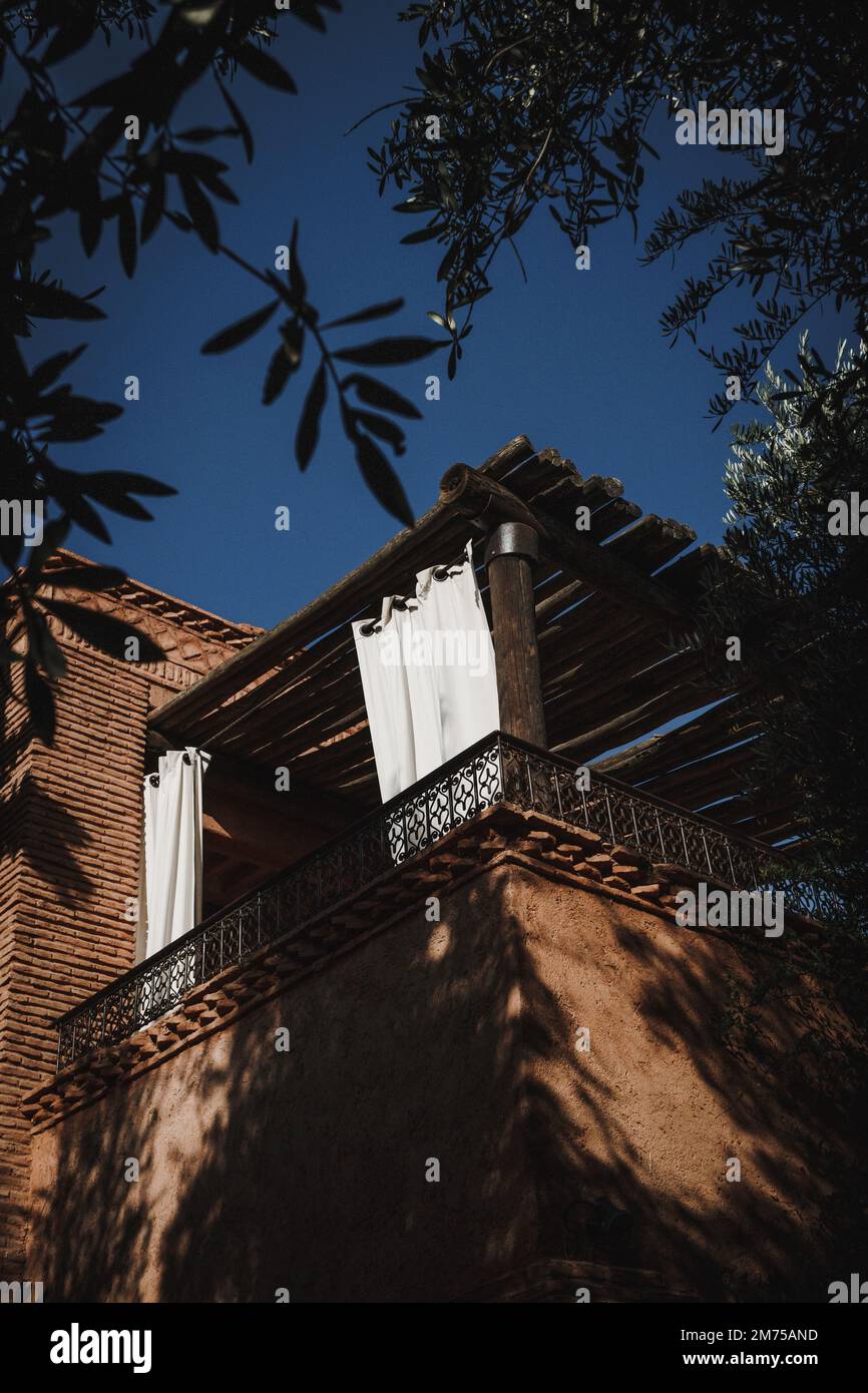 Roof top terrace in building in Marrakech in Morocco. Portrait ...