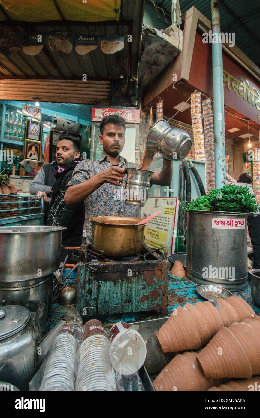 A vertical shot of a Chaiwala selling fresh mint masala chai in the ...
