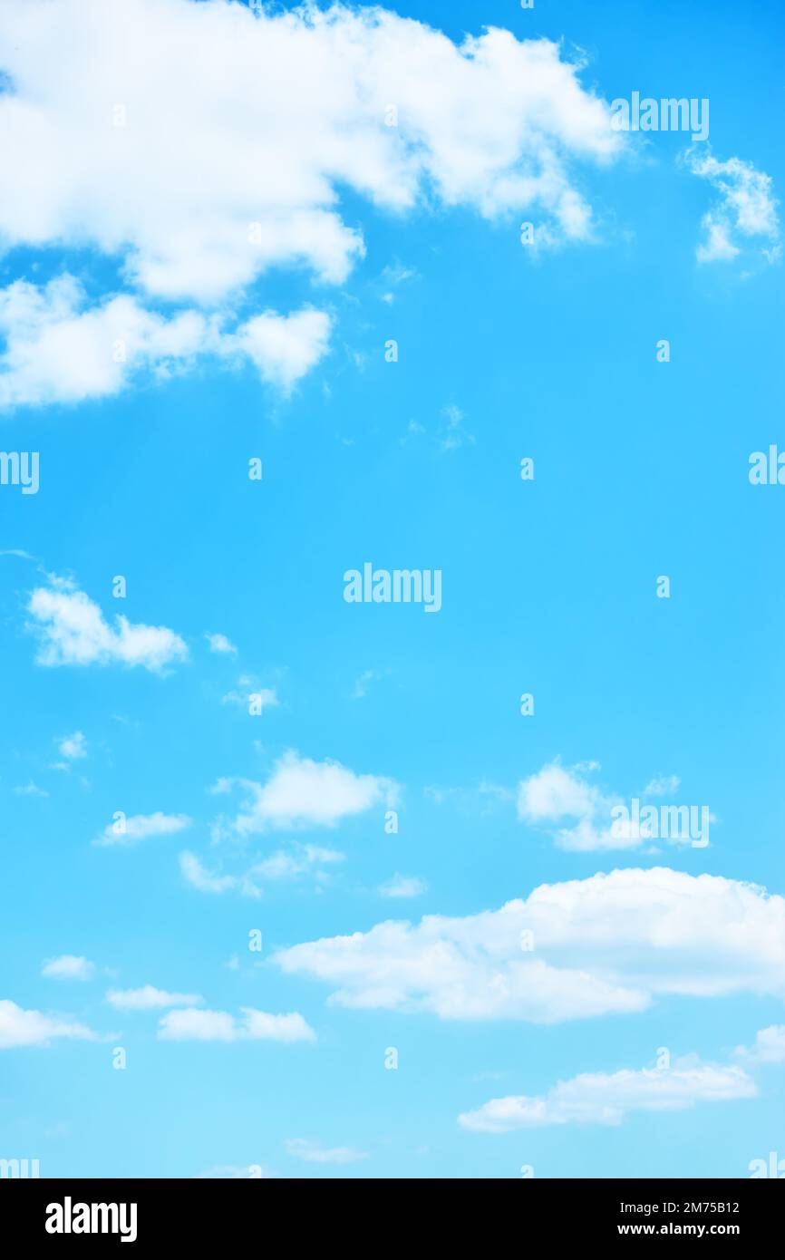 Blue sky with white clouds - vertical background, cloudscape Stock ...
