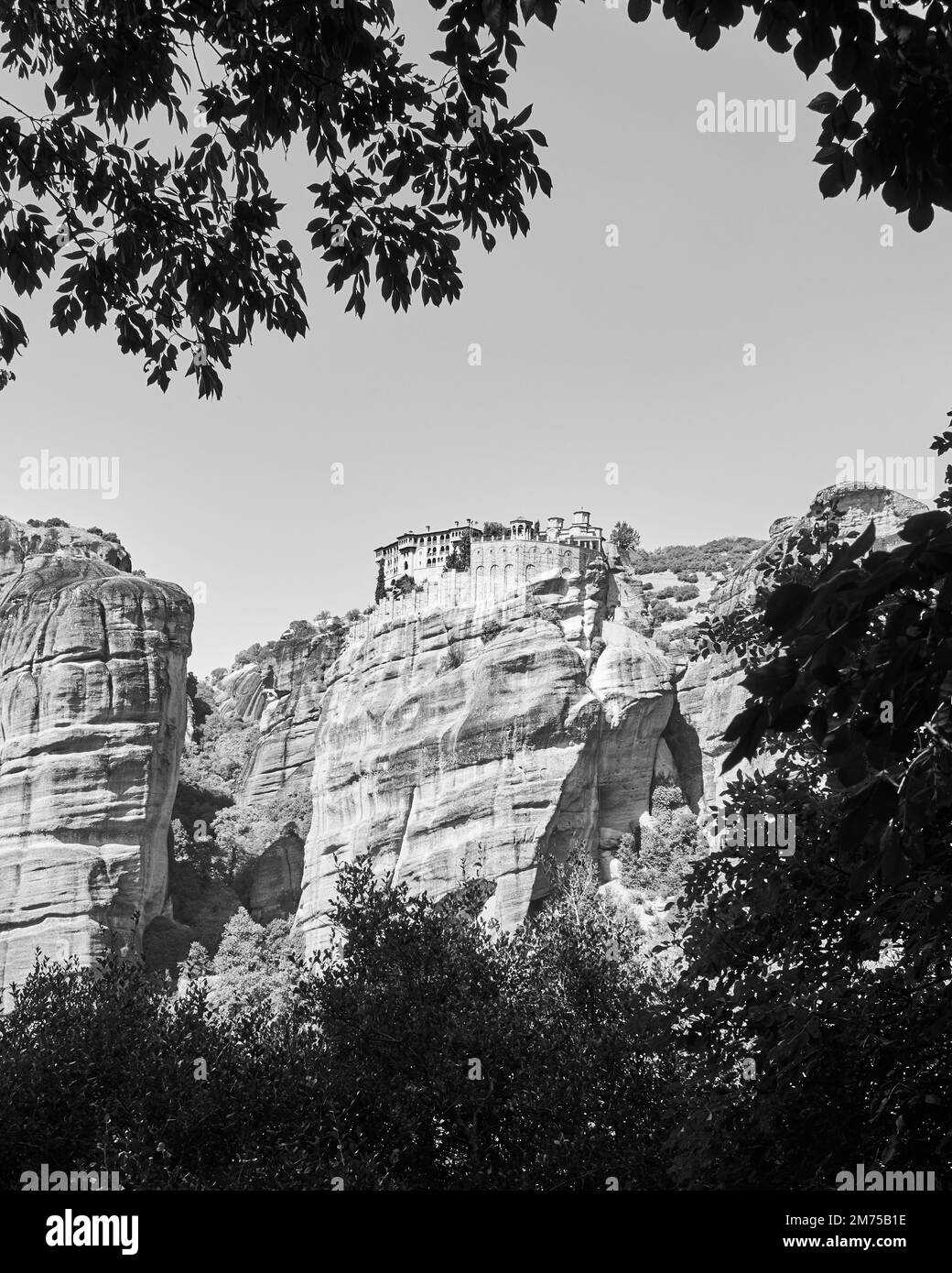 Cloisters on the rocks in Meteora, Greece. Landscape, black and white ...