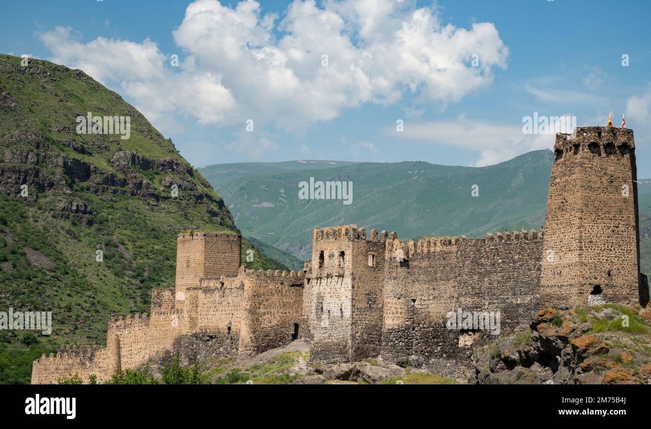 Medieval fort with hills and clouds in the background Stock Photo - Alamy