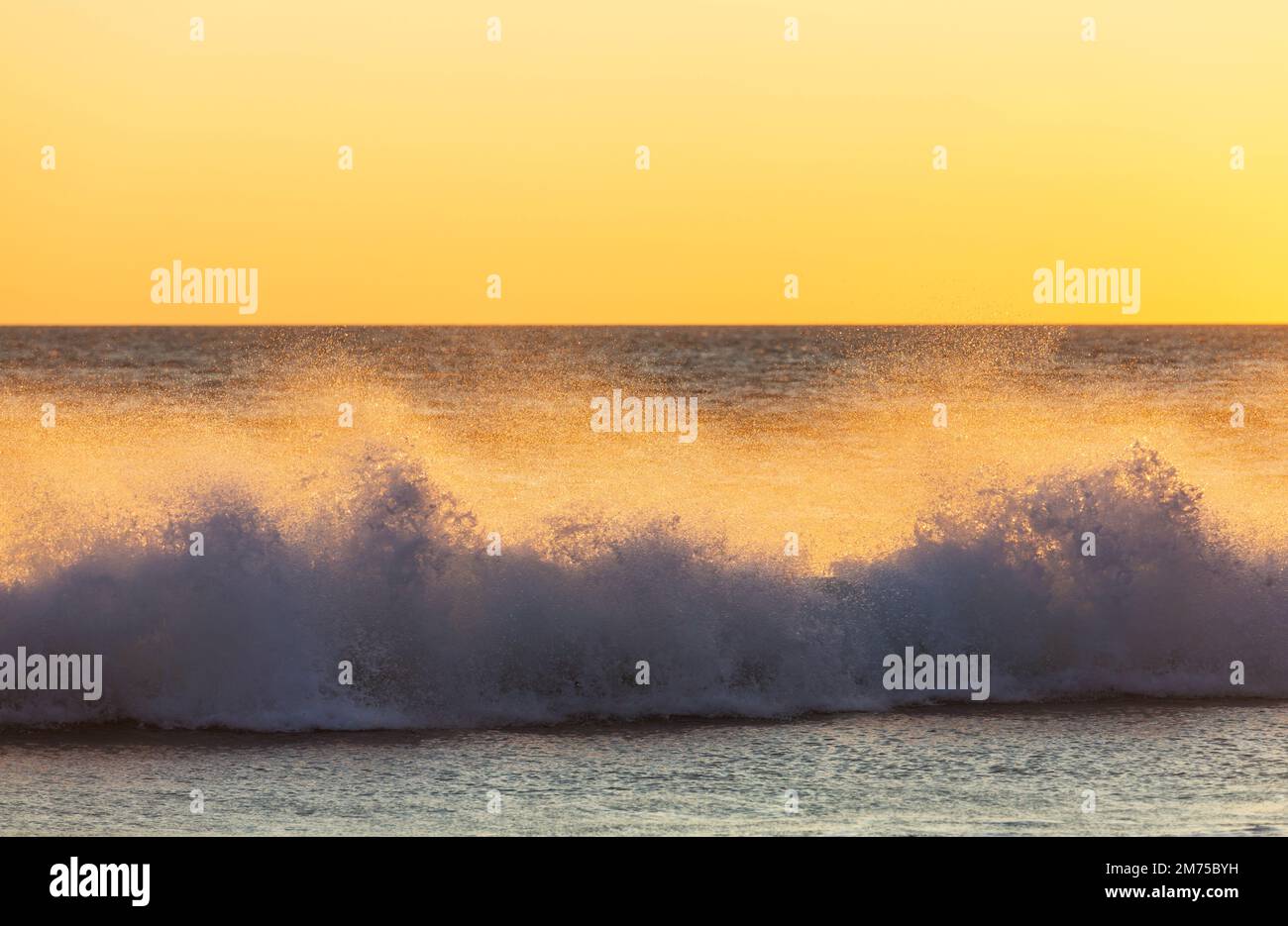 Blue wave on the beach. Dramatic natural background Stock Photo - Alamy