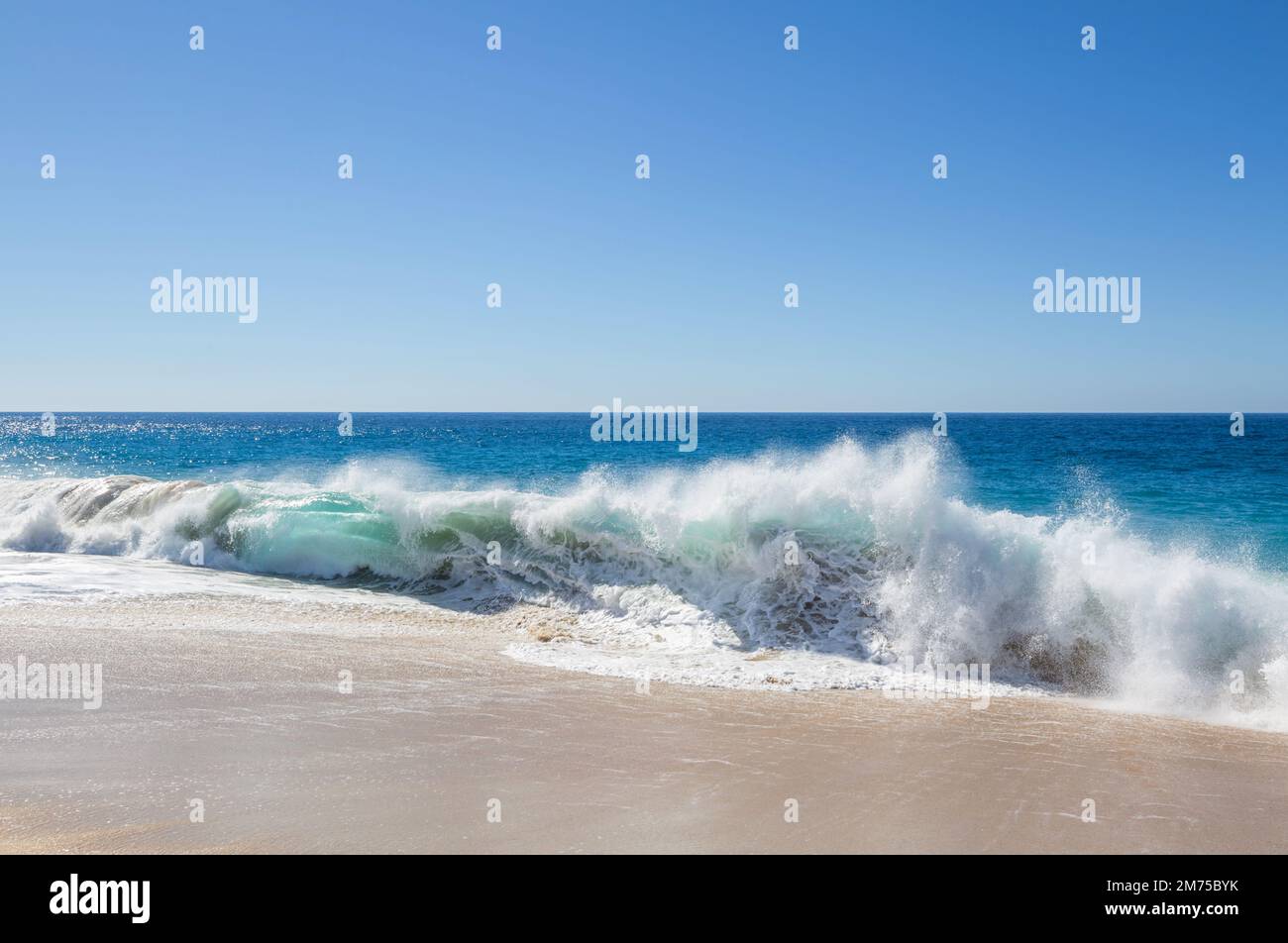 Blue wave on the beach. Dramatic natural background Stock Photo - Alamy