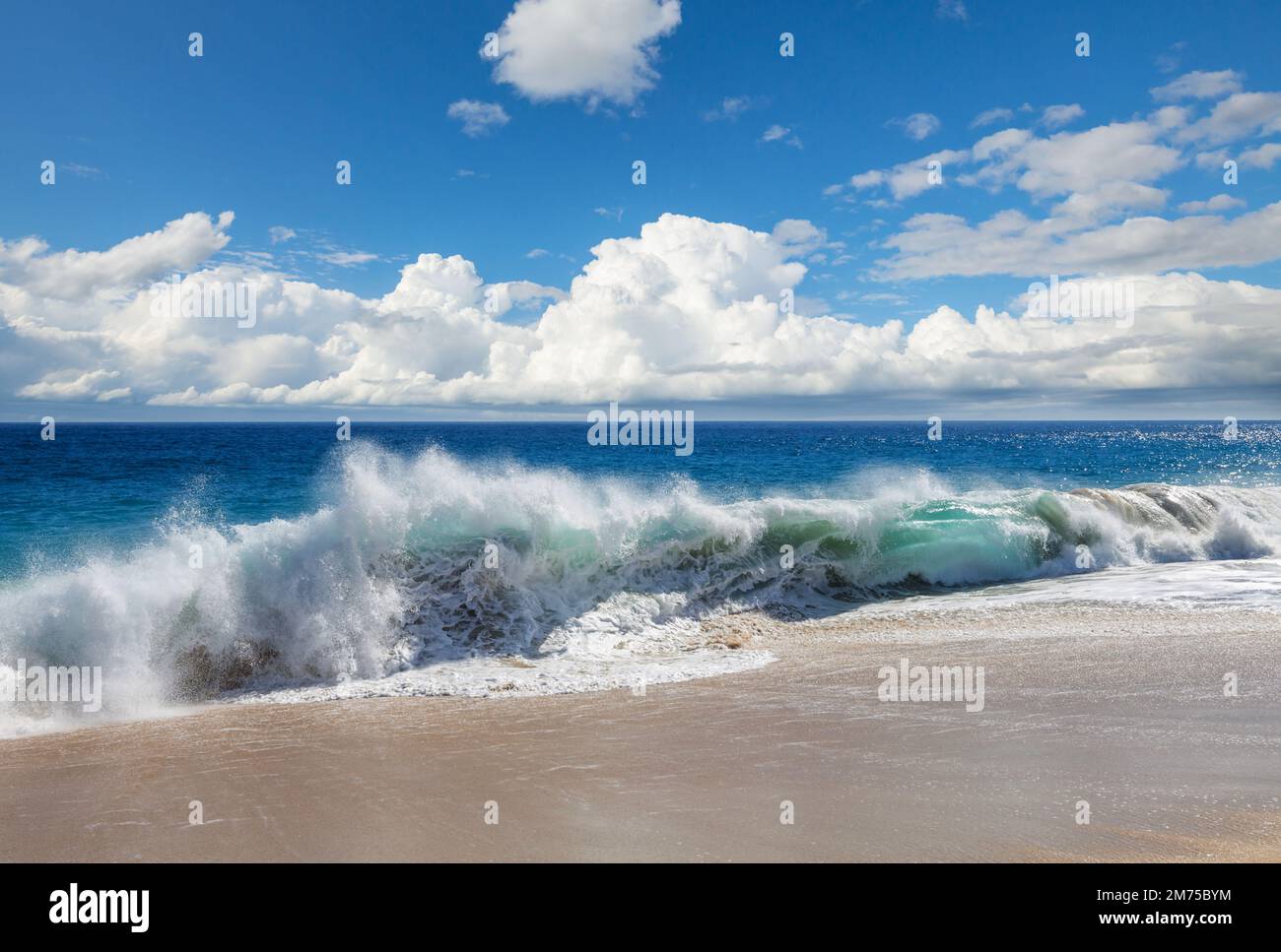 Blue wave on the beach. Dramatic natural background Stock Photo - Alamy