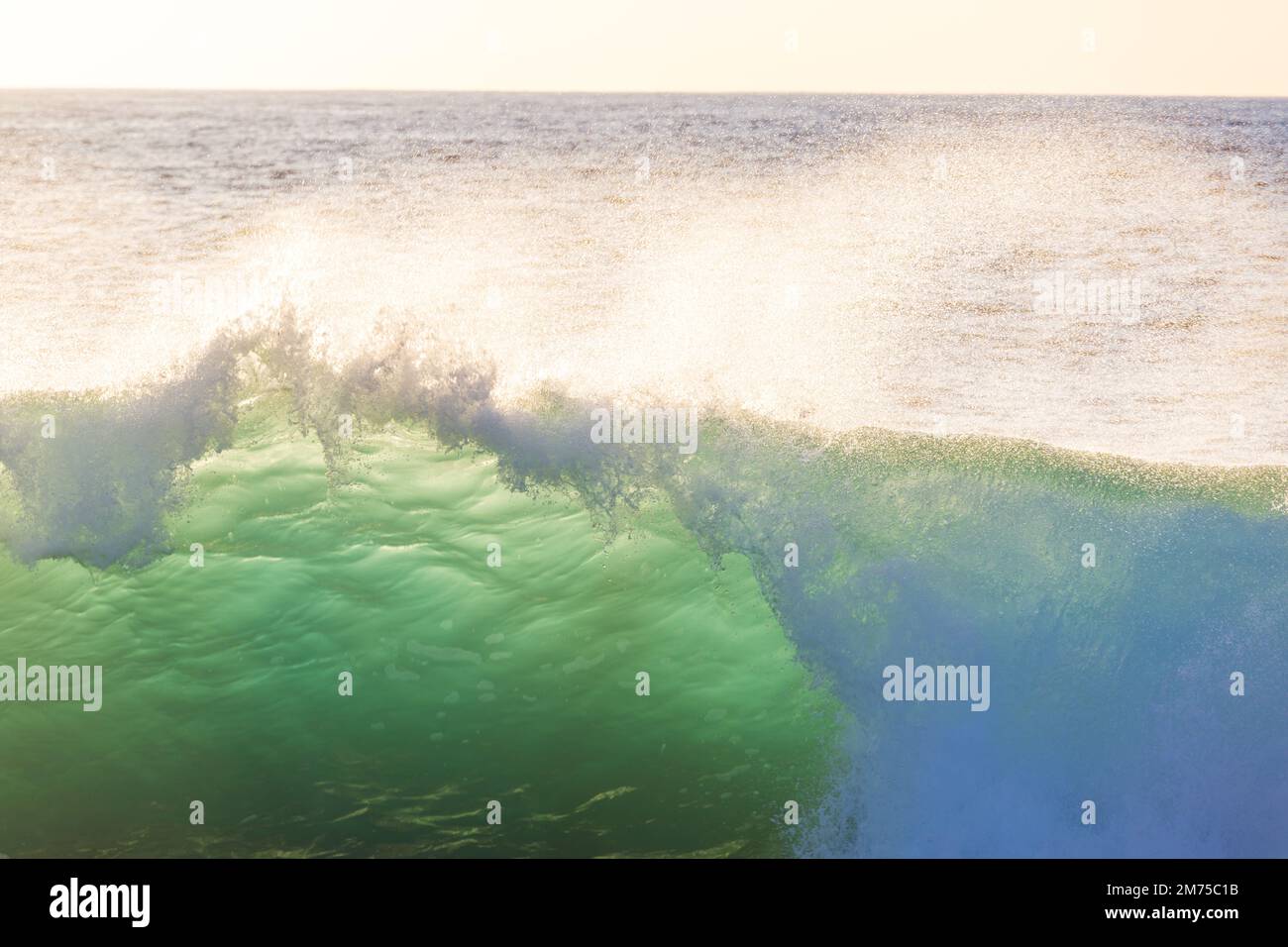 Blue wave on the beach. Dramatic natural background Stock Photo - Alamy