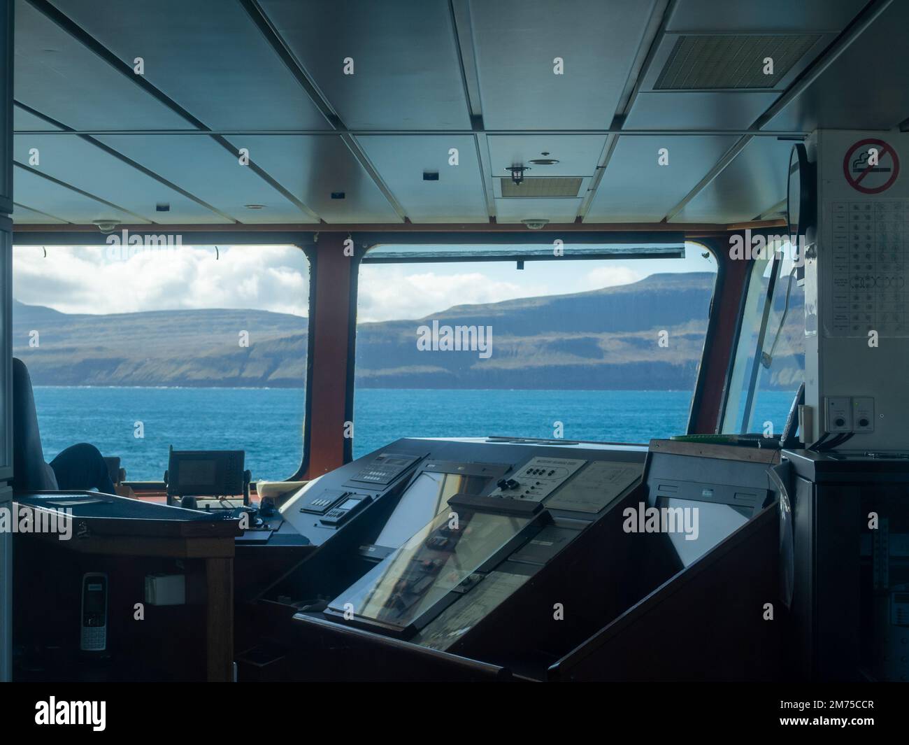 Ferrie cabin interior with Sandoy island in the horizon Stock Photo - Alamy